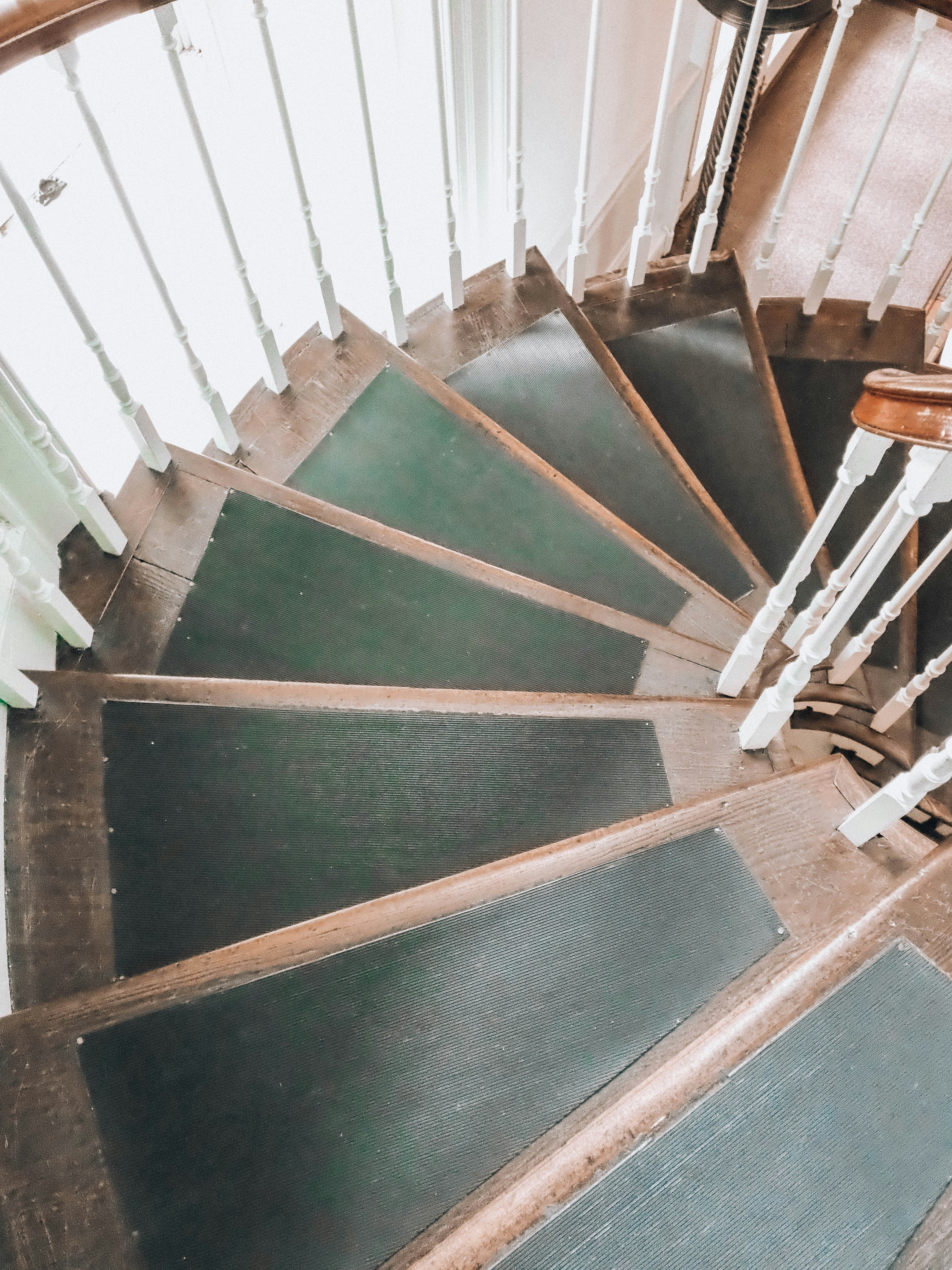Spiral Descent: A Top-Down View of a Vintage Stairwell