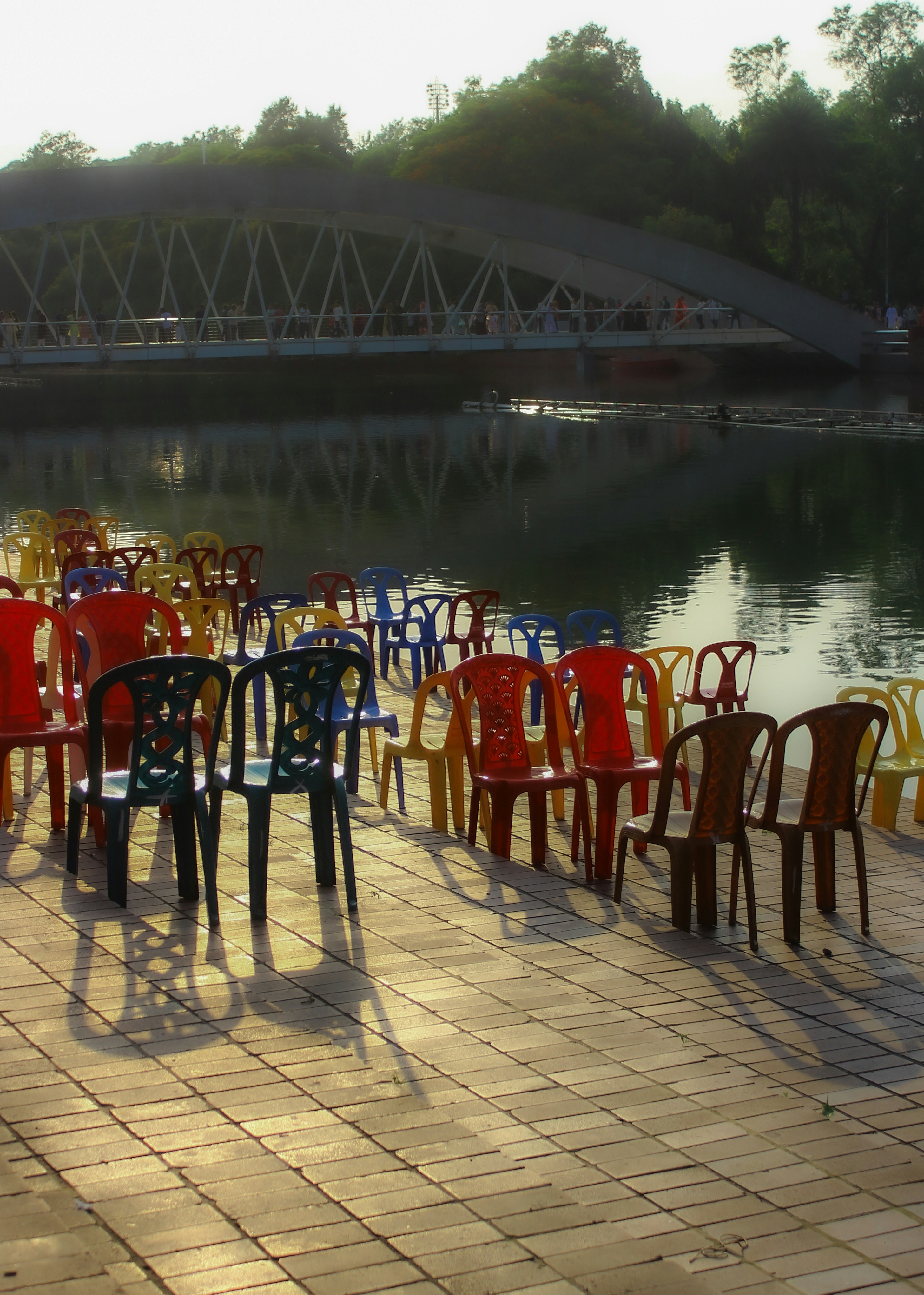 Colorful Chairs on the Riverside Plaza at Golden Hour