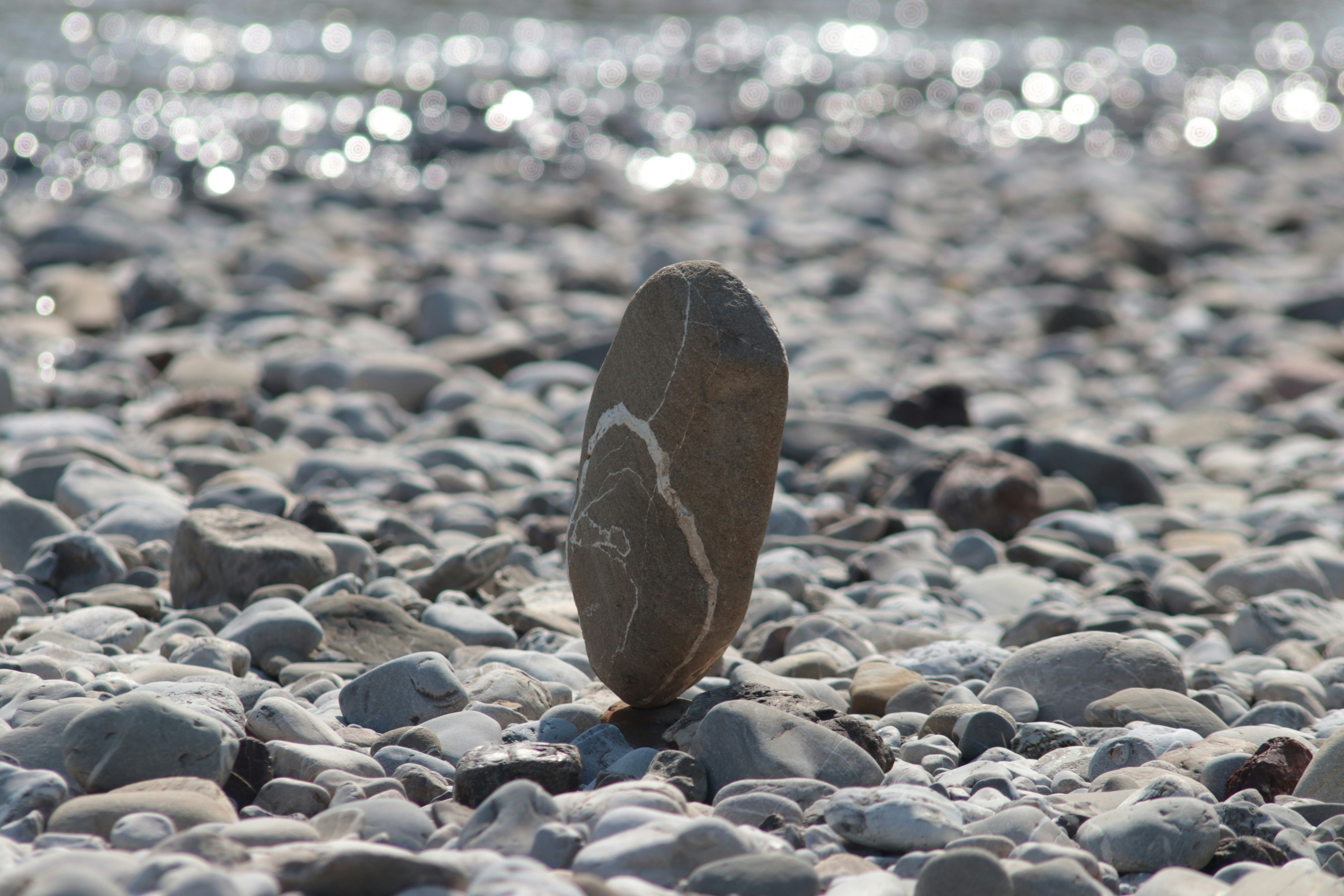 Stone Sentinel on a Pebble Beach