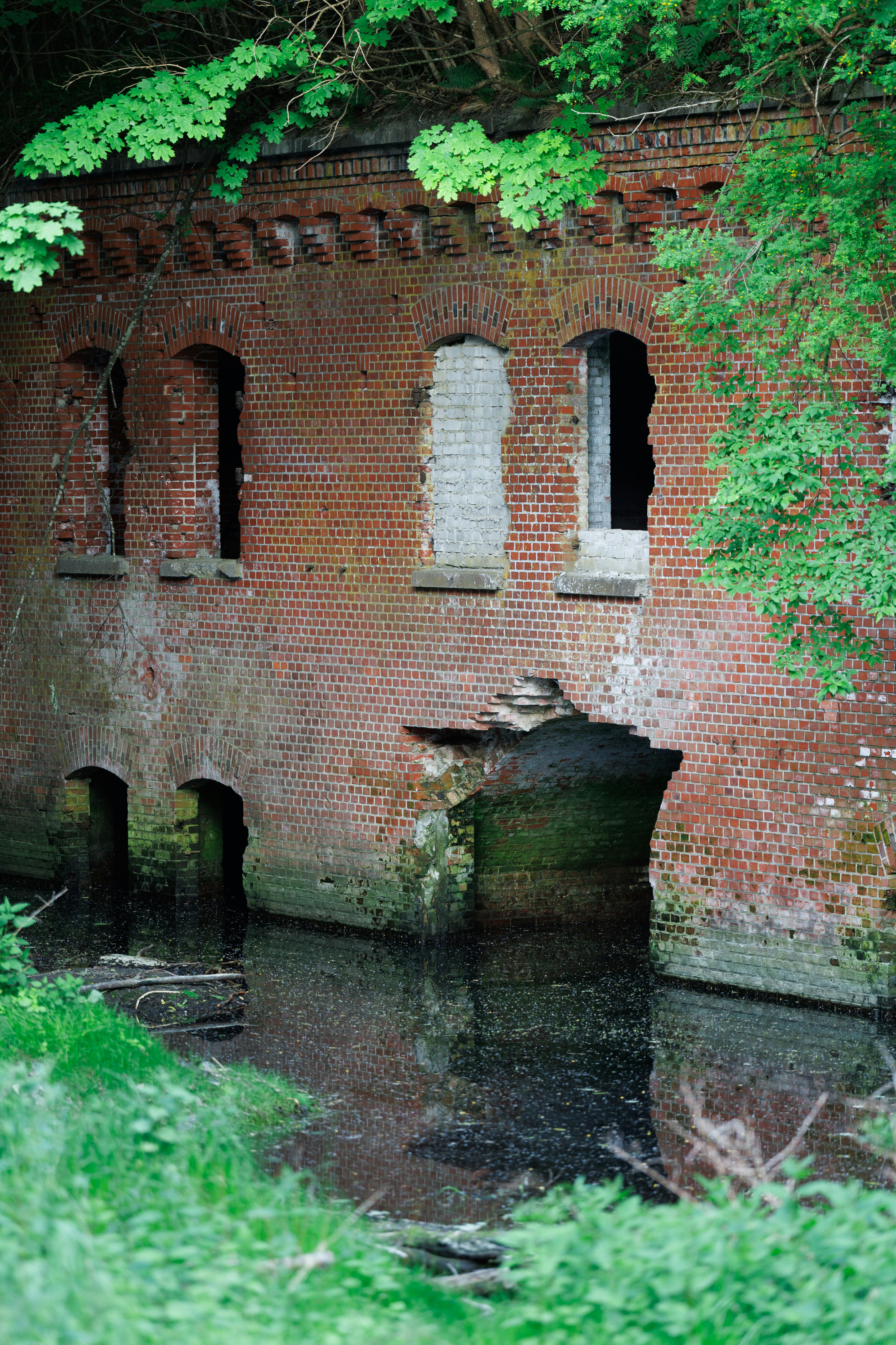Overgrown Bricks and Quiet Echoes by the Water