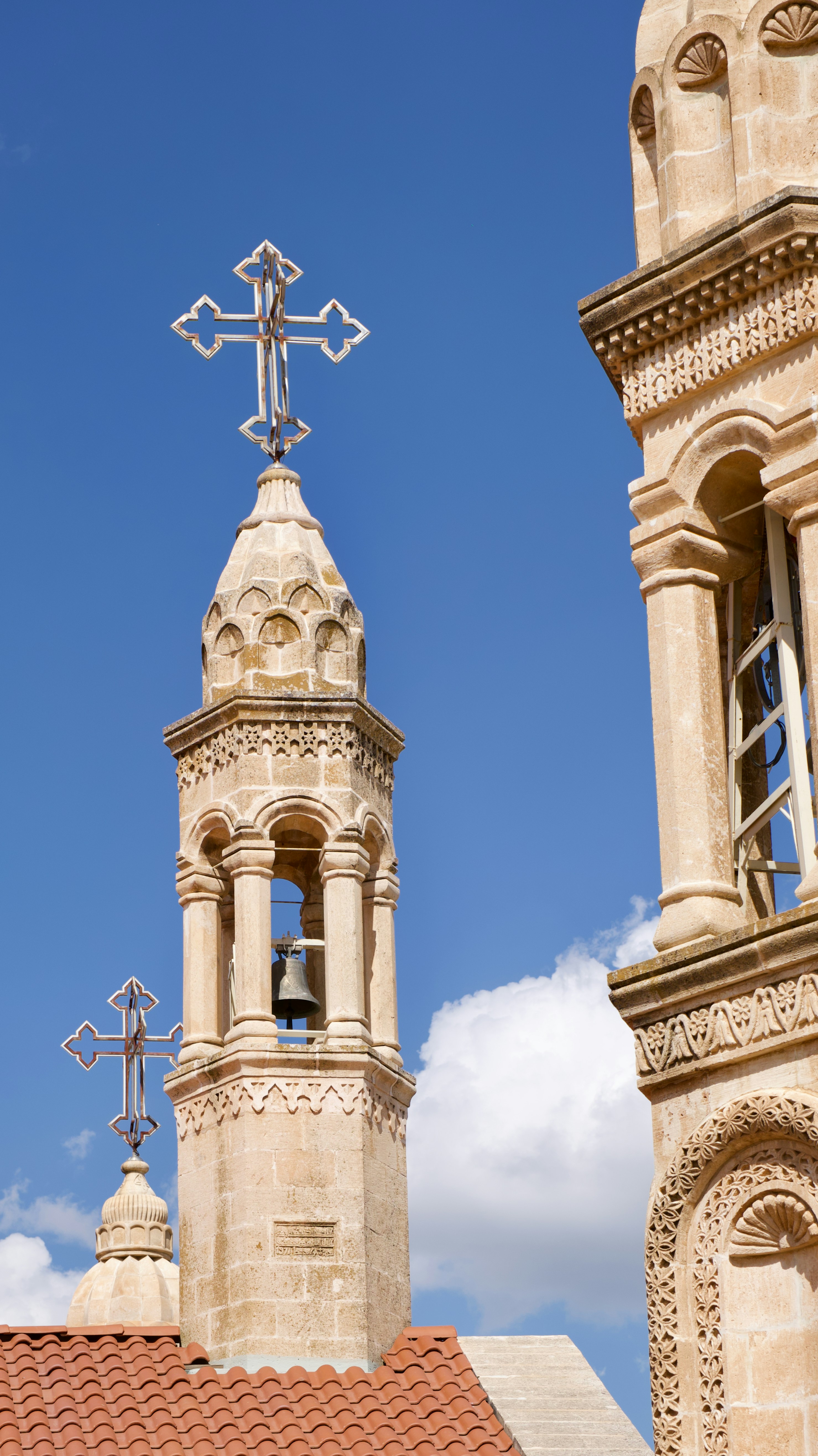 Cross of the Canyon Sky: A Church Bell Tower Reaches Toward Blue