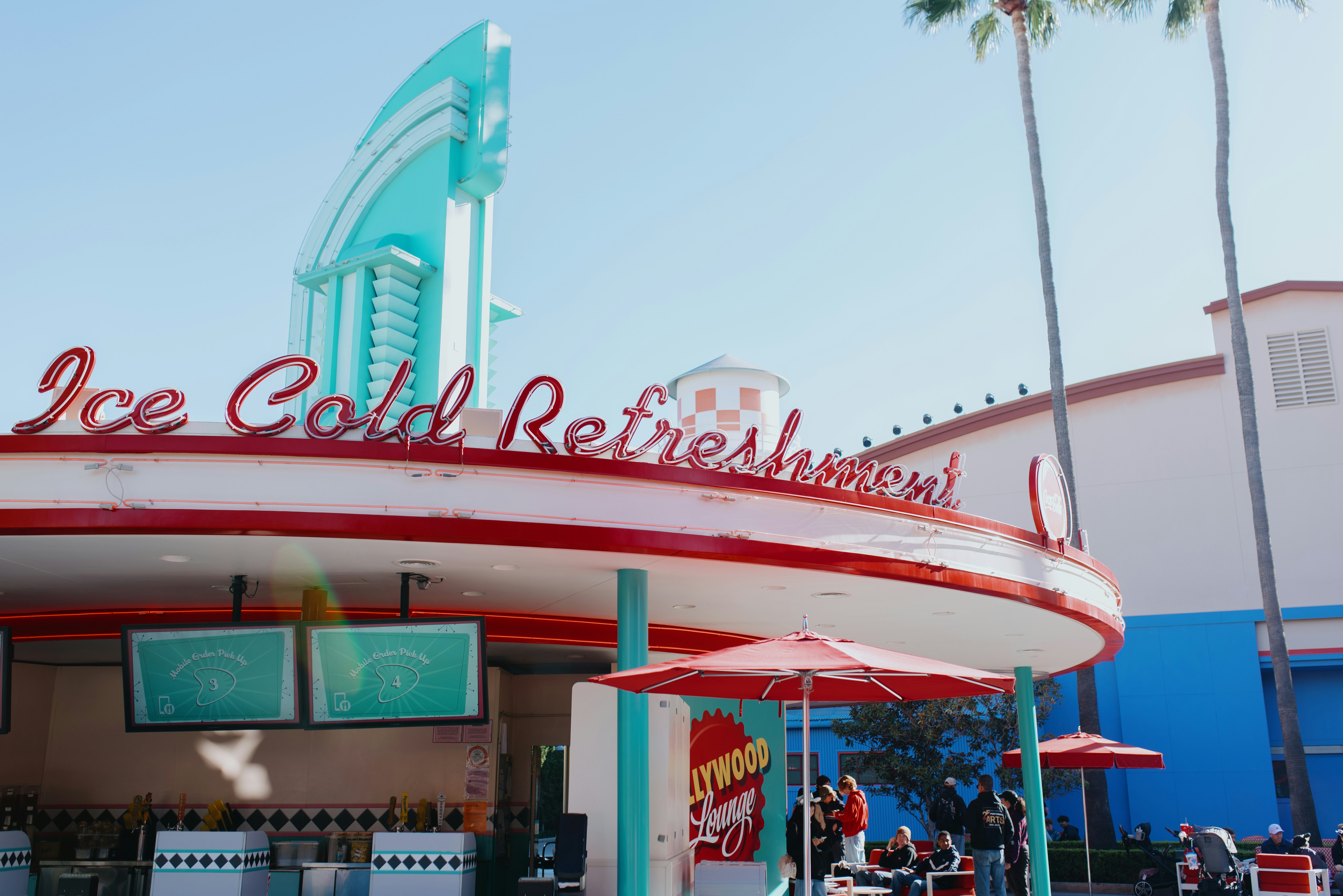 Neon Ocean Drive: Ice Cold Refreshments at Sunset Corner