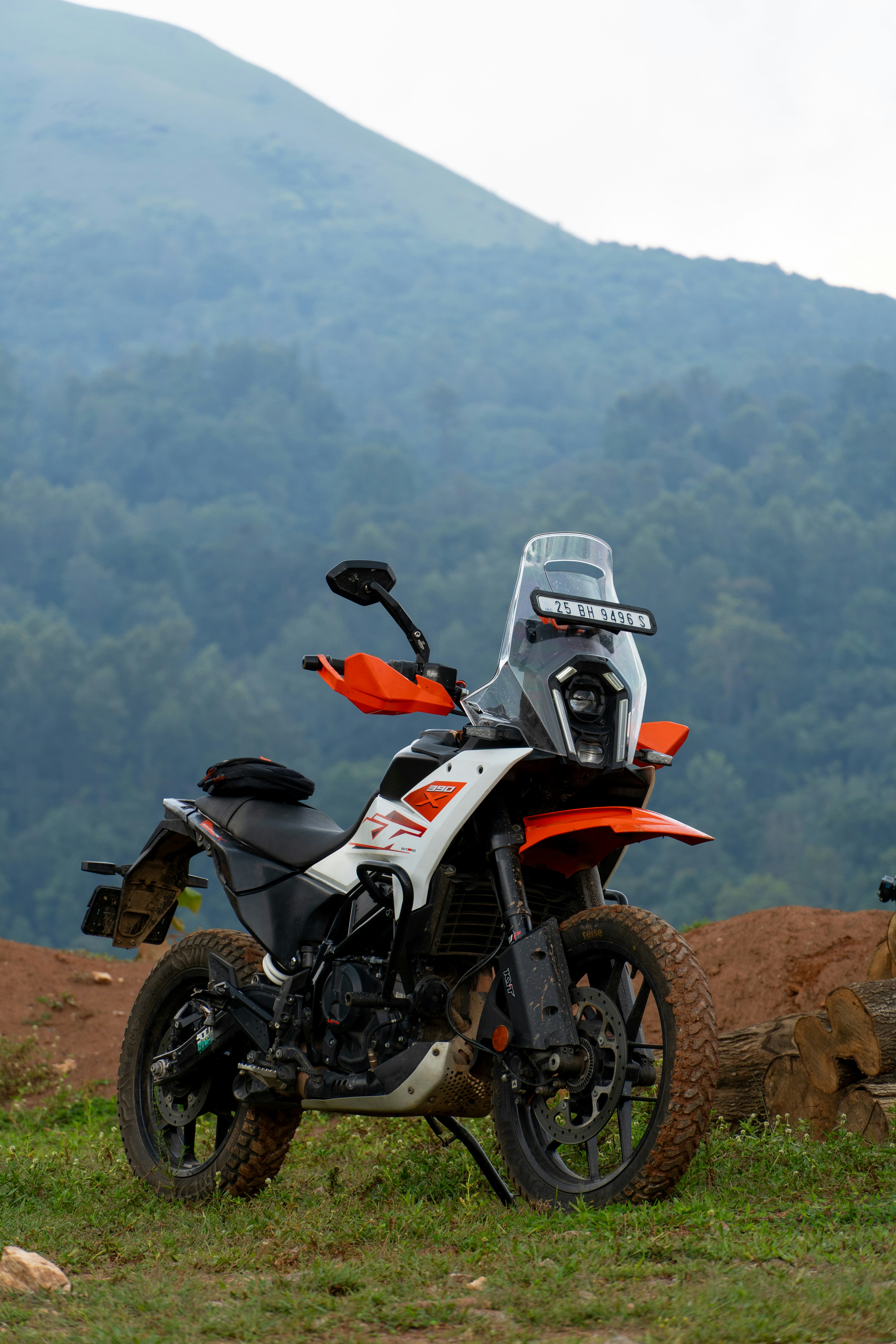 Orange-Black Dual-Sport Riser: A Moto-Adventure On Dirt
