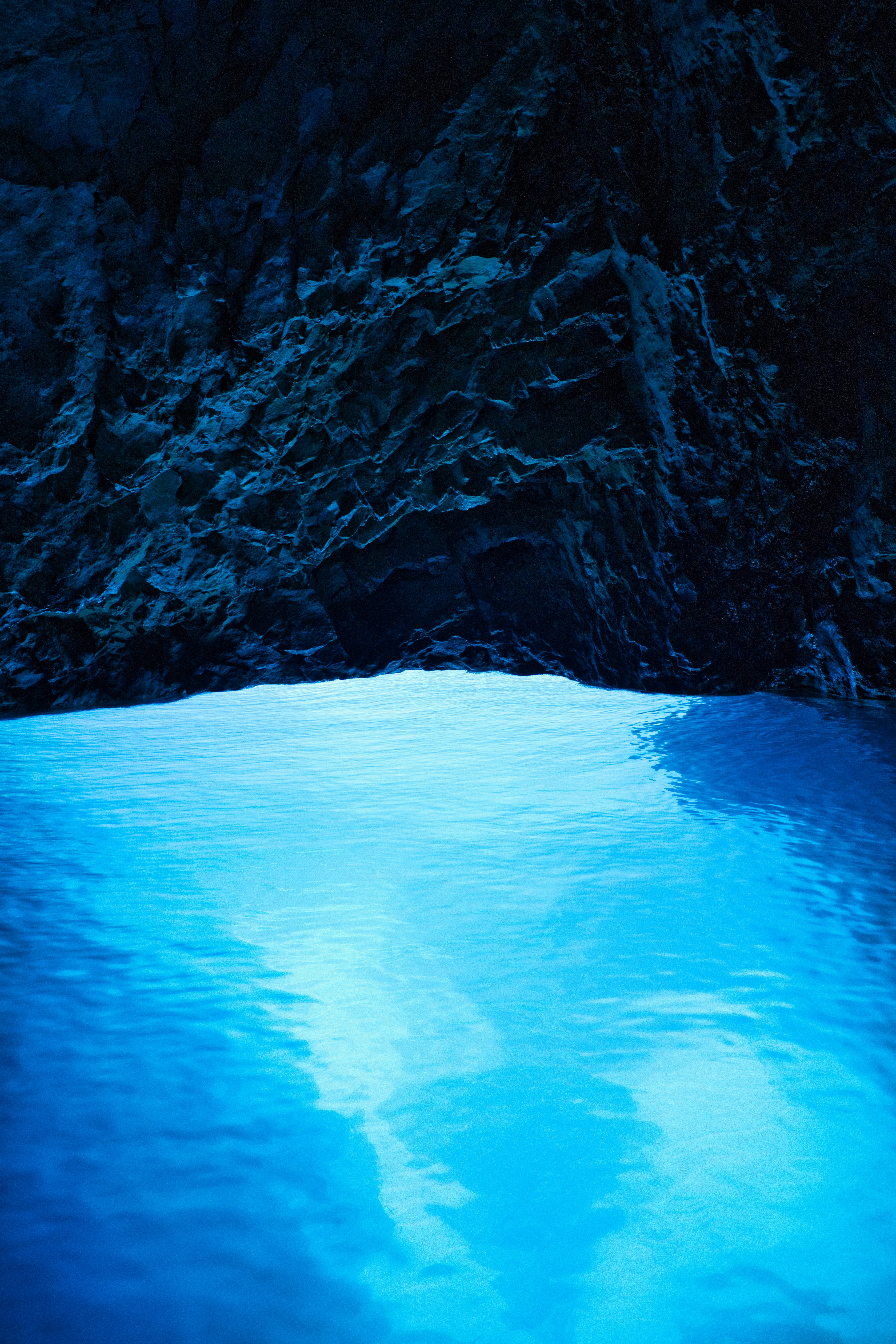 Cavernous Blue: Light Crossing a Silent Tide