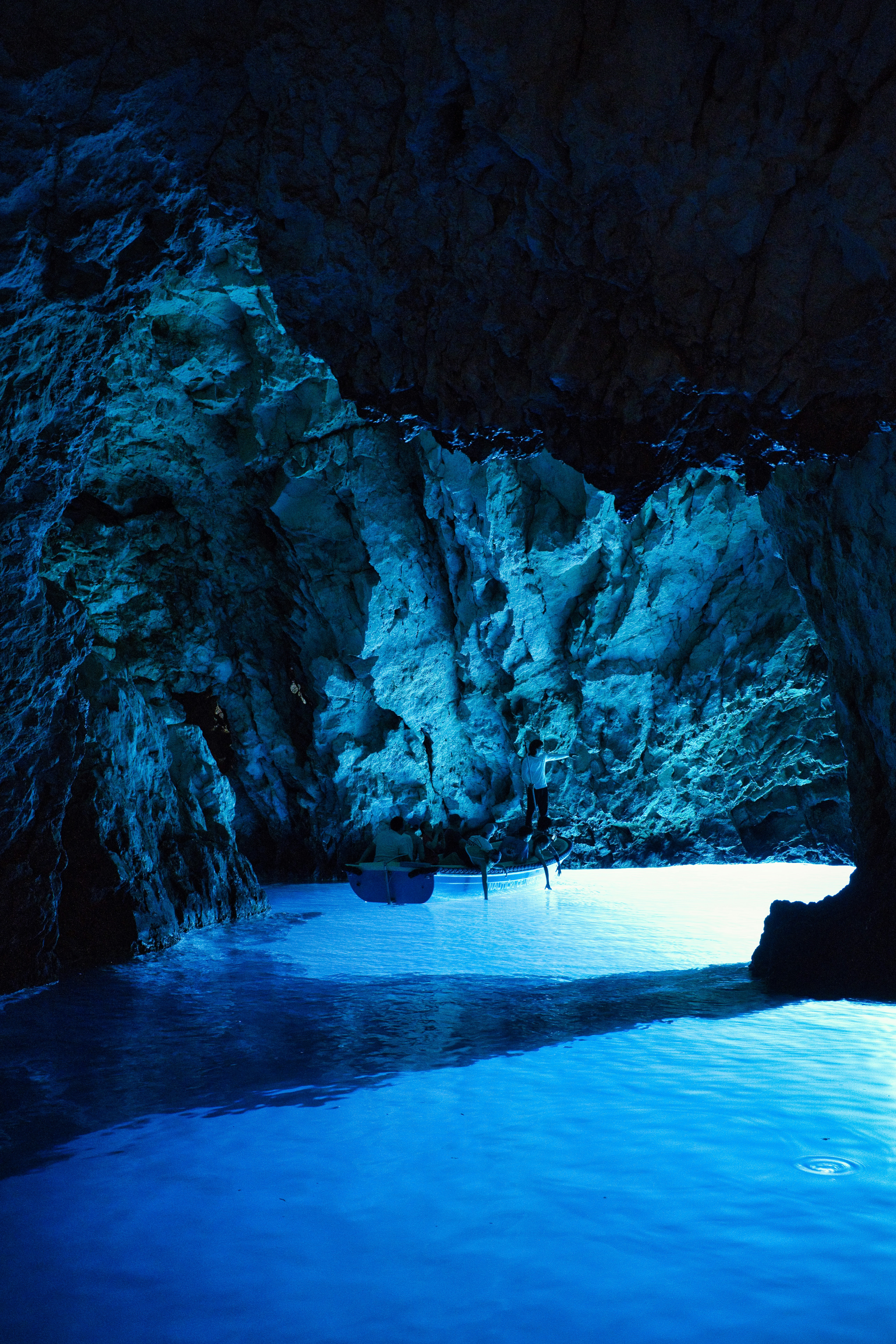 Blue Cove: Light Pierces the Lagoon Through a Cavern Gate