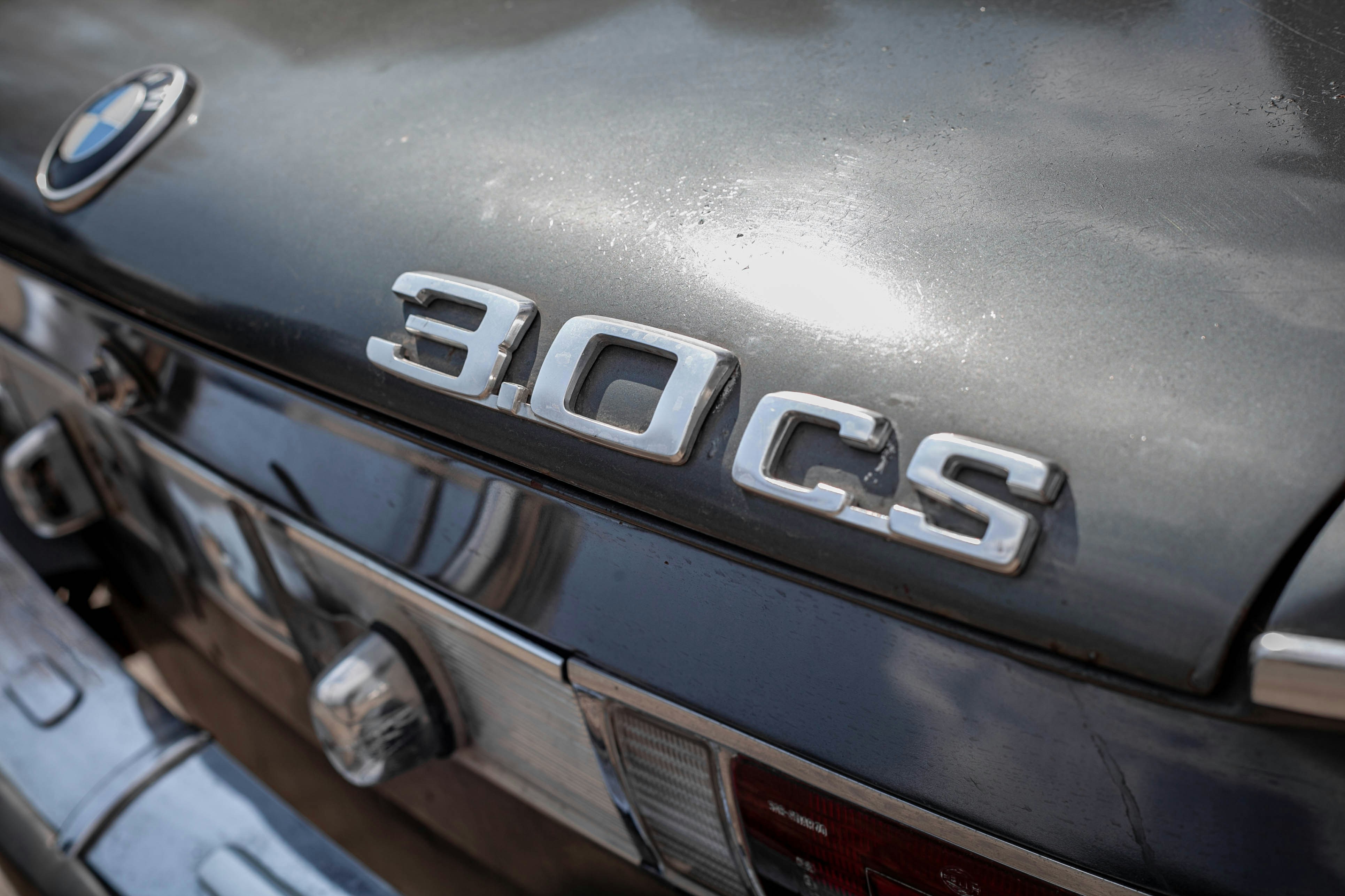 Vintage badge, modern polish: the back of a BMW 3.0CS glow