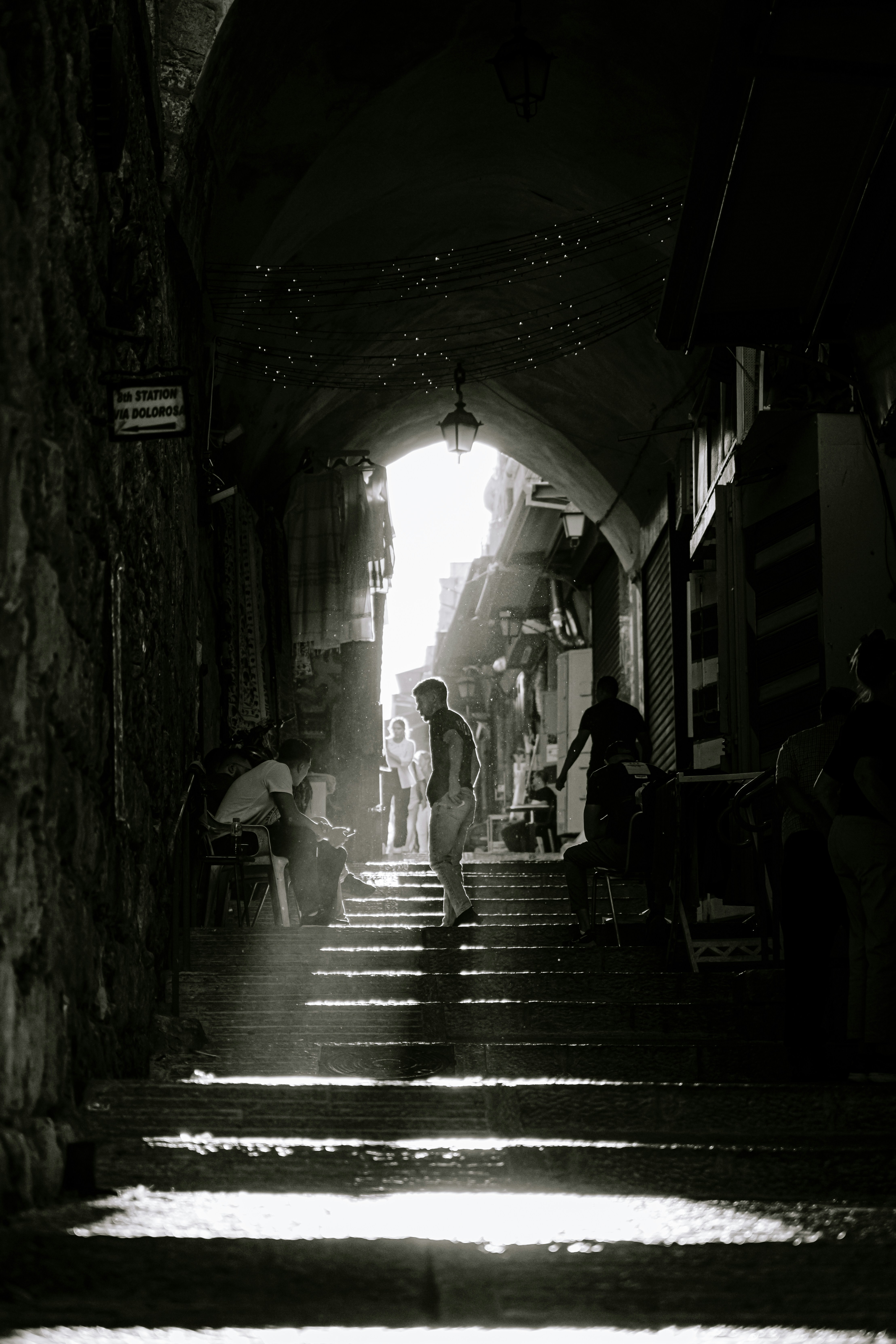Steps to Light: A Narrow Pass Through Evening Shadows