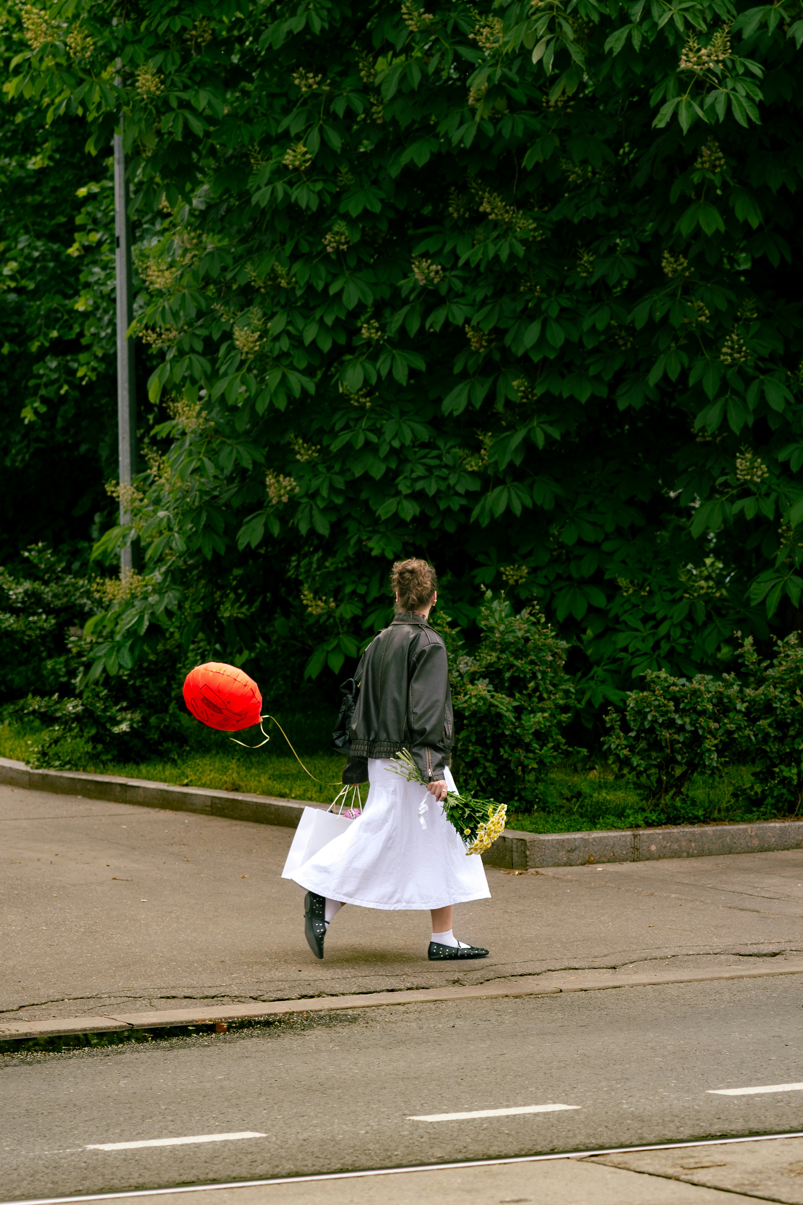 A Quiet Walk with a Red Balloon