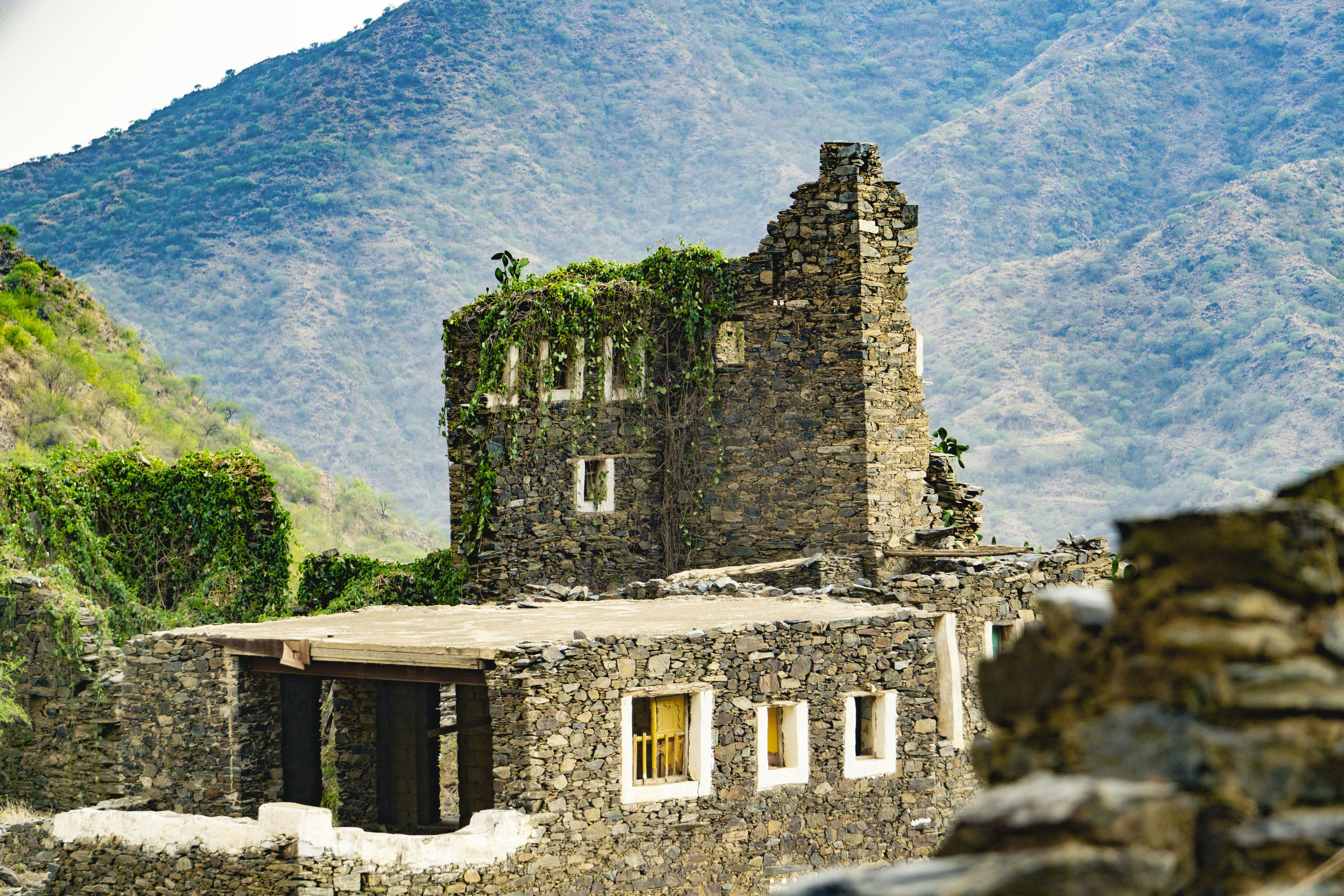 Ruined Stone House Among Green Mountains