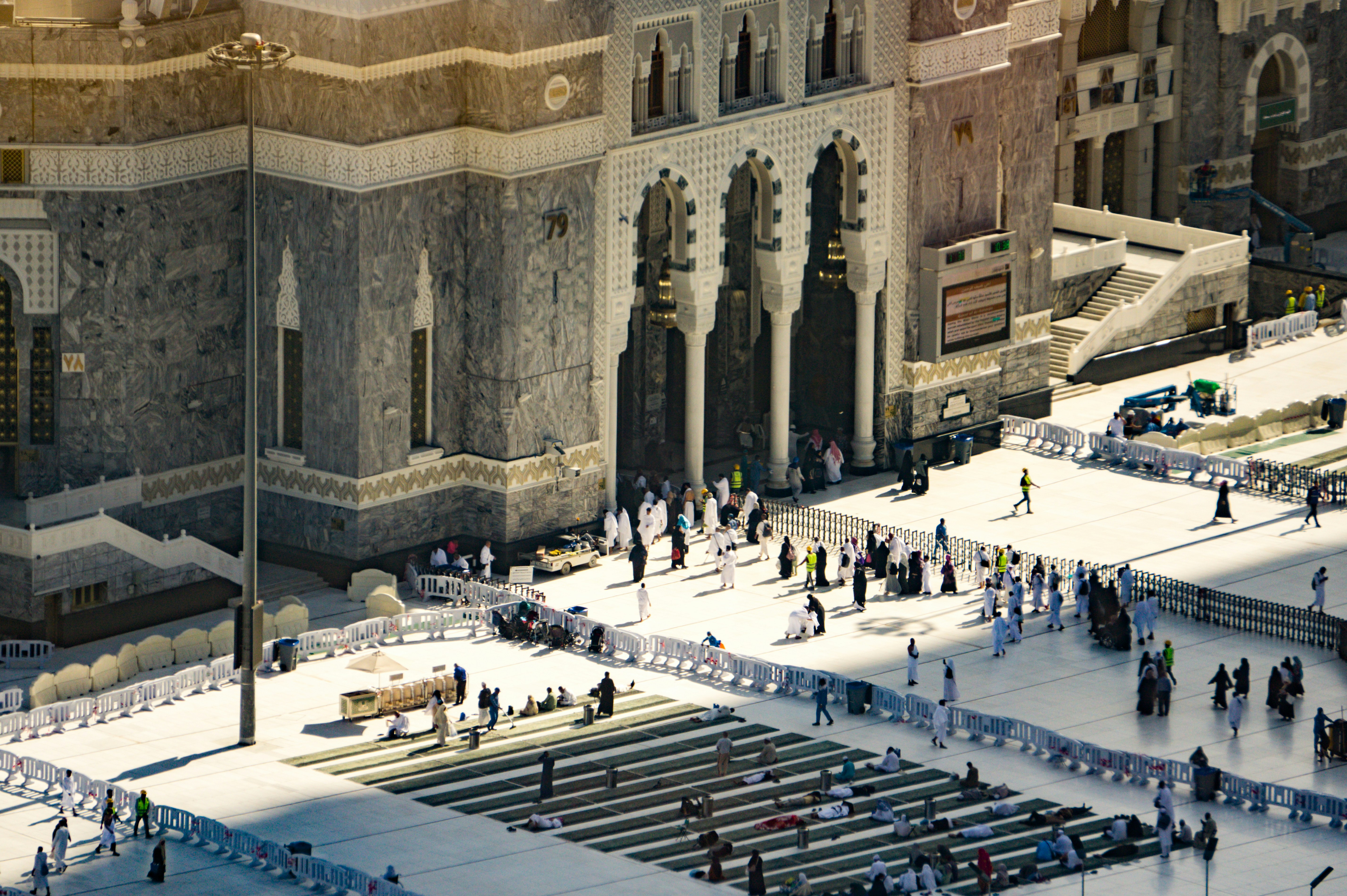 Sunlit Plaza at the Gate: Aerial View of Worship Steps and Facade