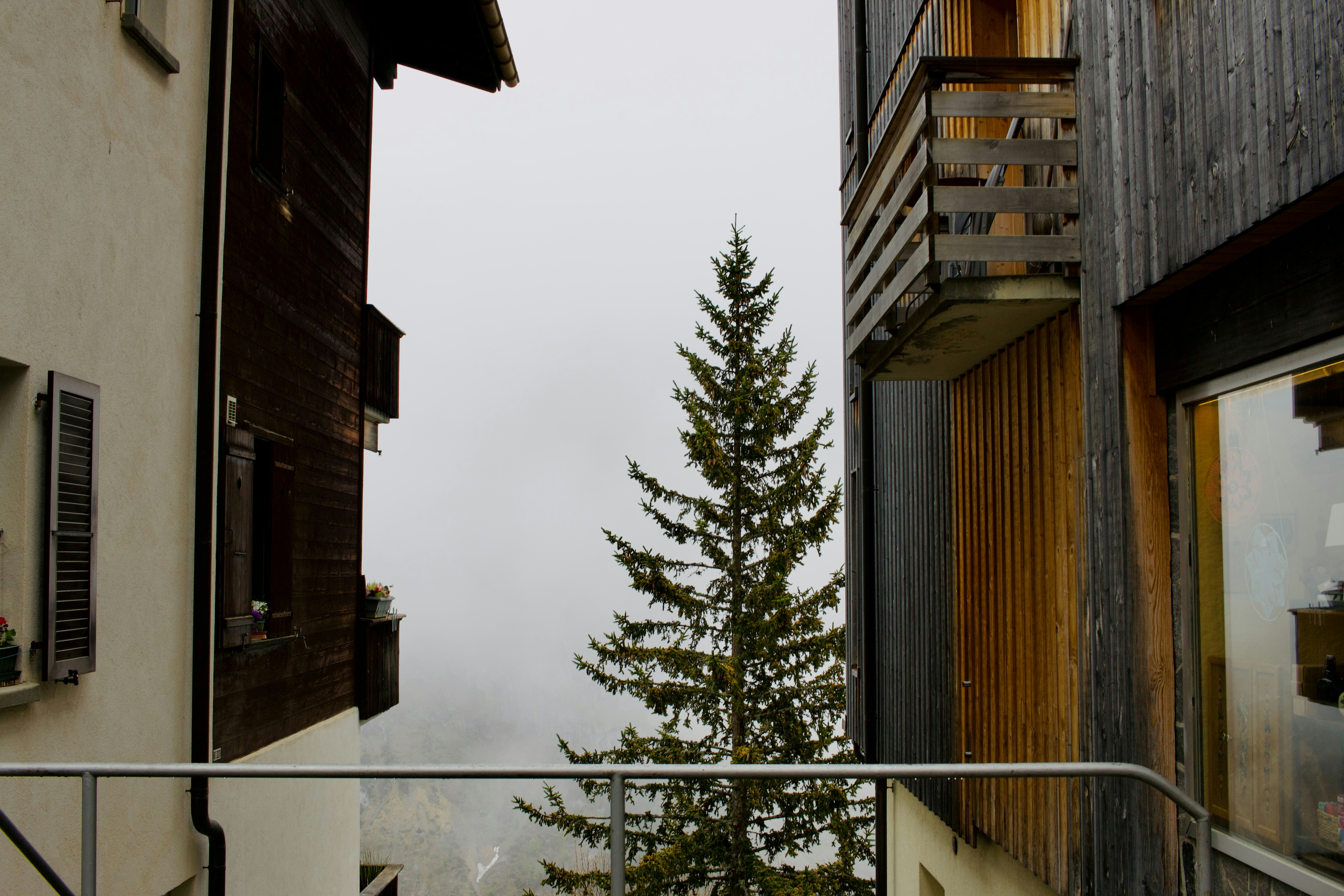 Mountain View Through a Narrow Balcony Corridor