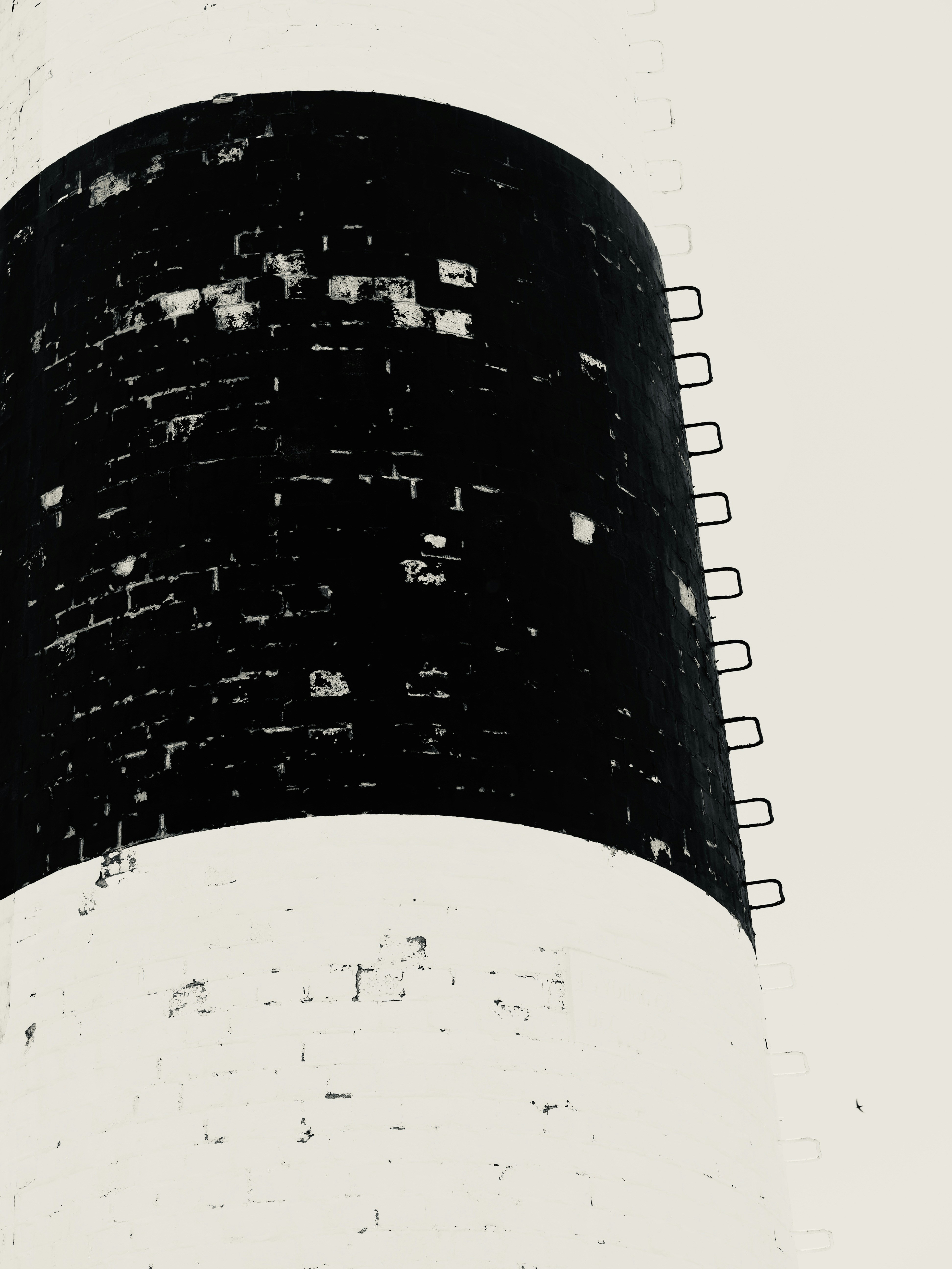 Monochrome Water Tank: A Quiet Tilt-Shift of Structure and Light
