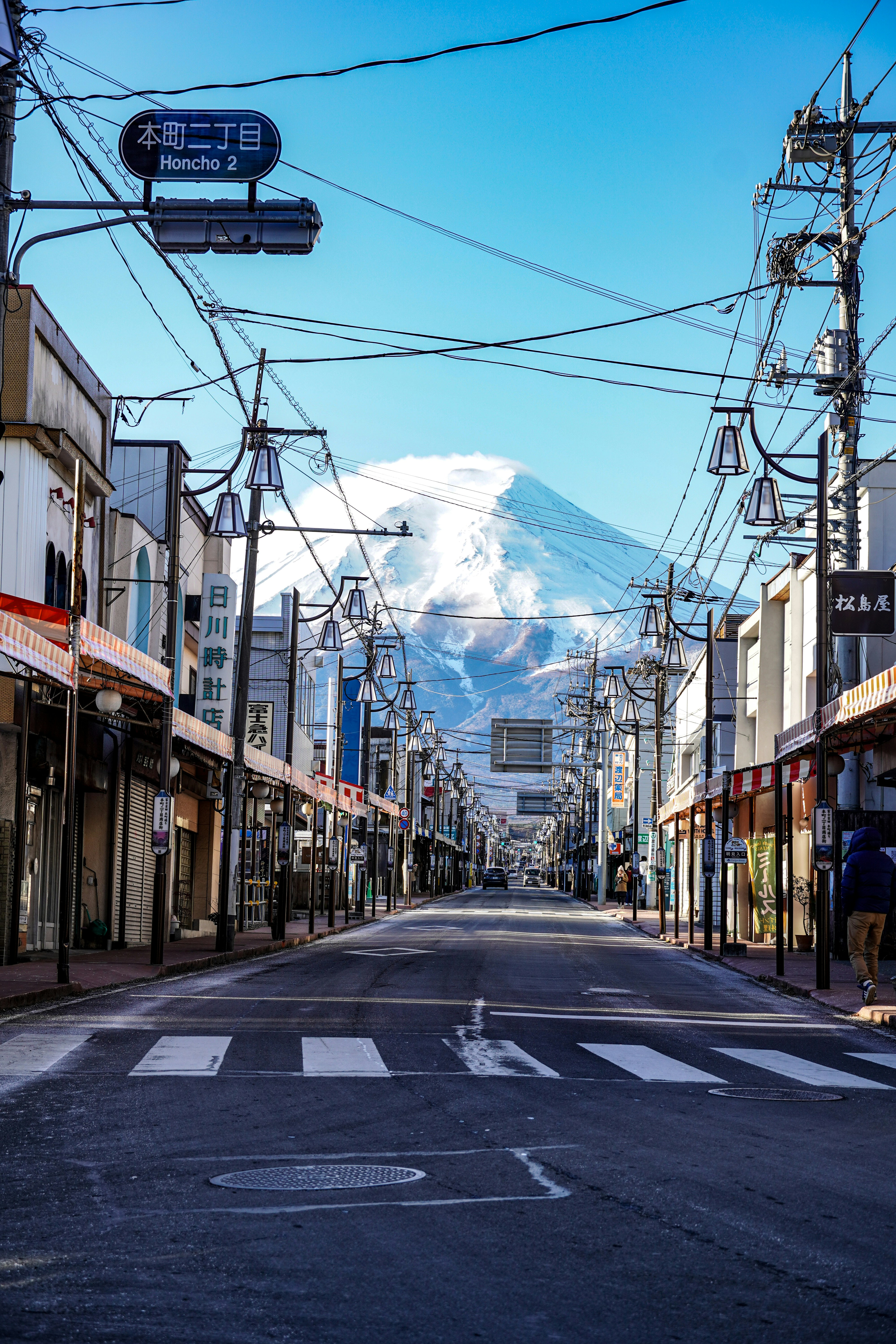 Mountains Through an Alley: A Quiet Street Toward Fuji