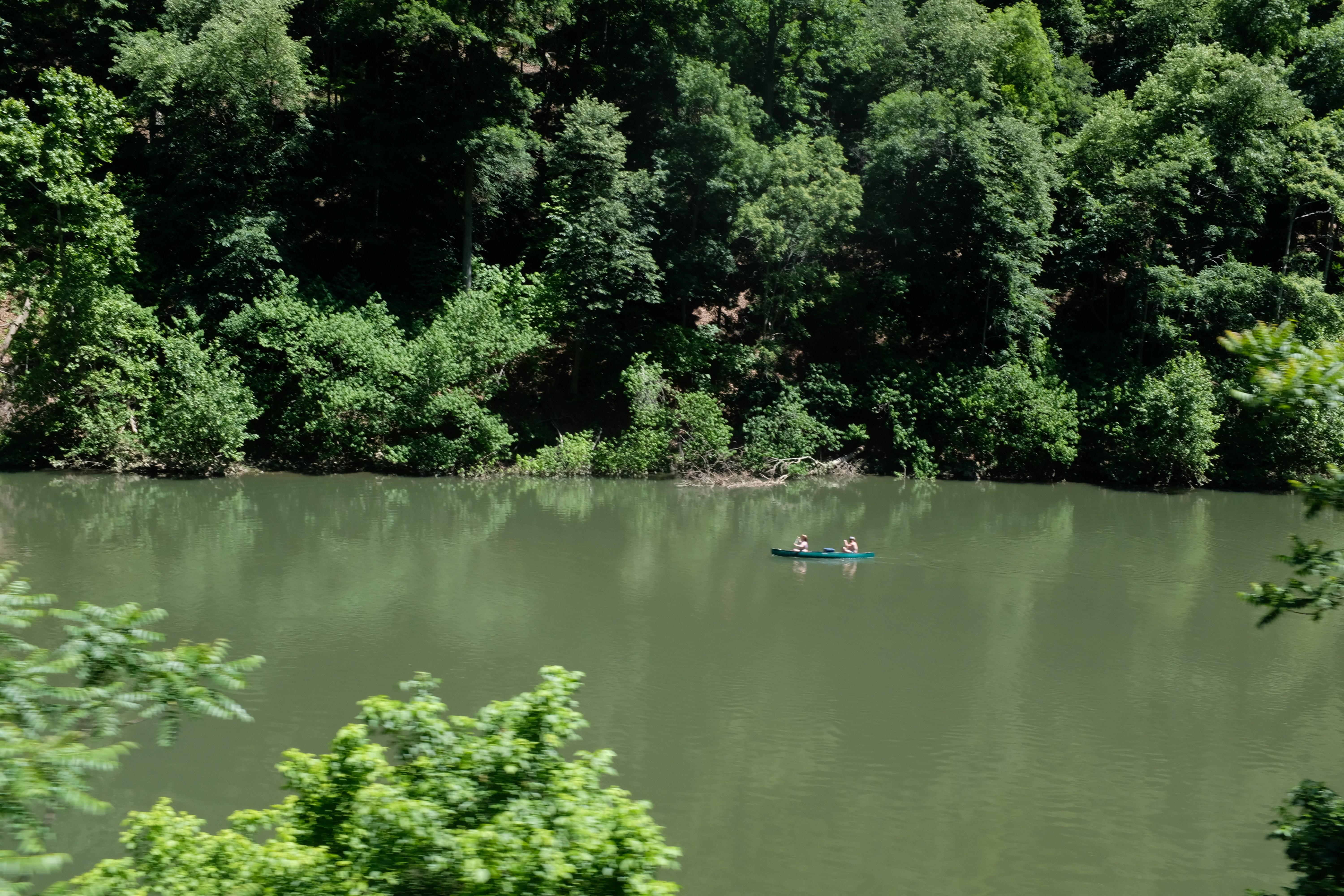 Kayakers Here, Quiet River at Dusk