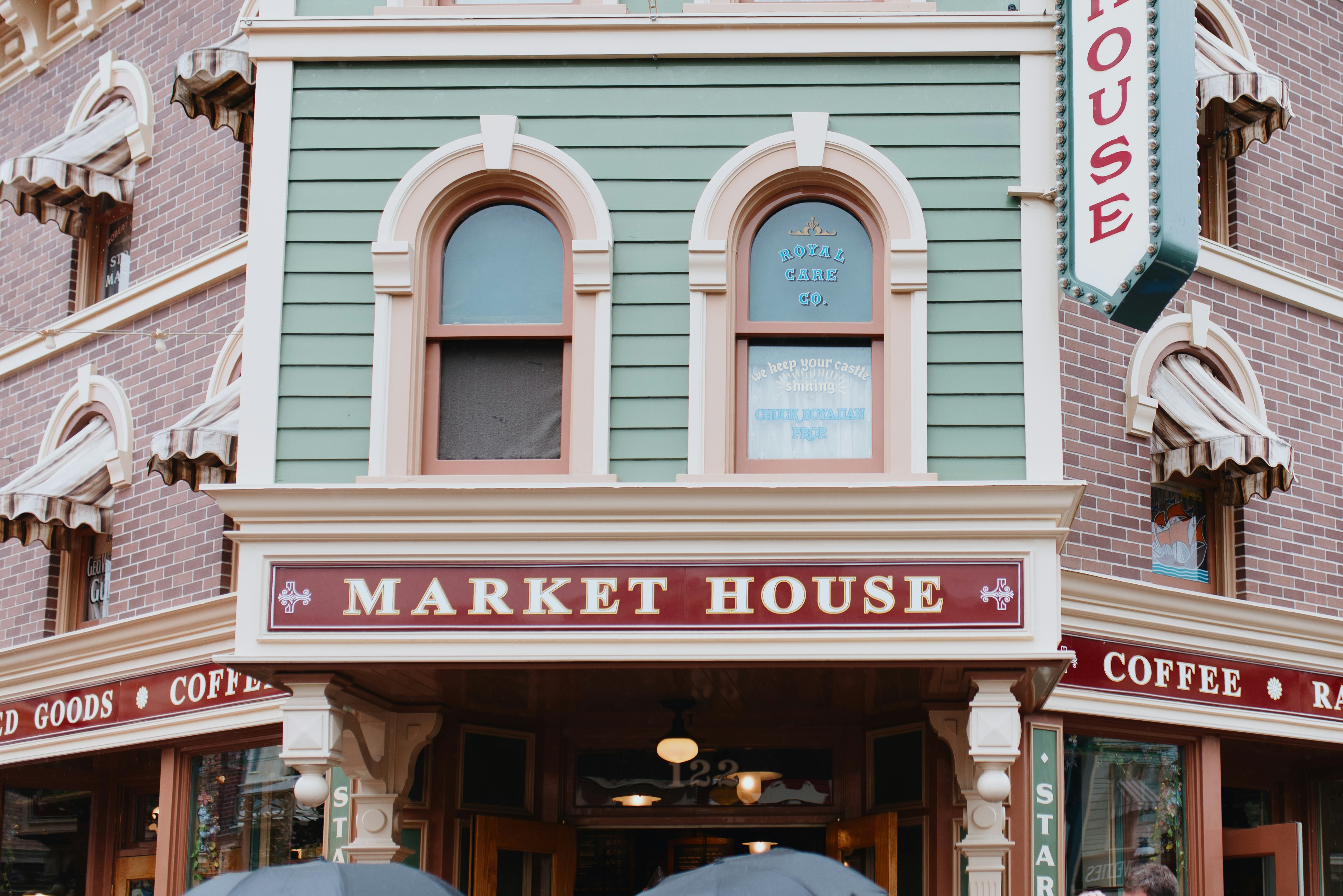 Market House Facade: A Retro Corner Coffee Perch