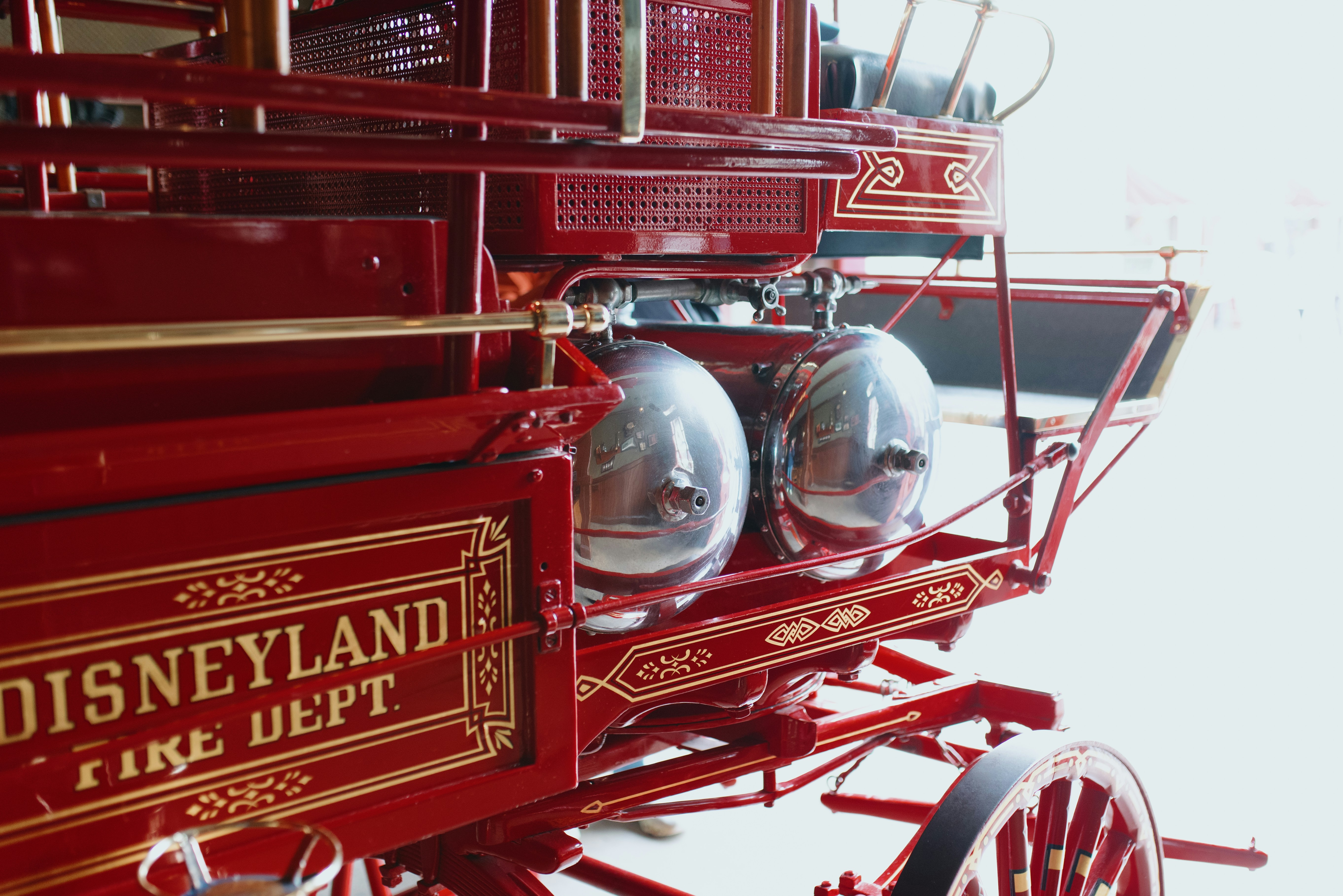 Red Steamwork Elegance: A Glimpse of Disneyland’s Vintage Firepower