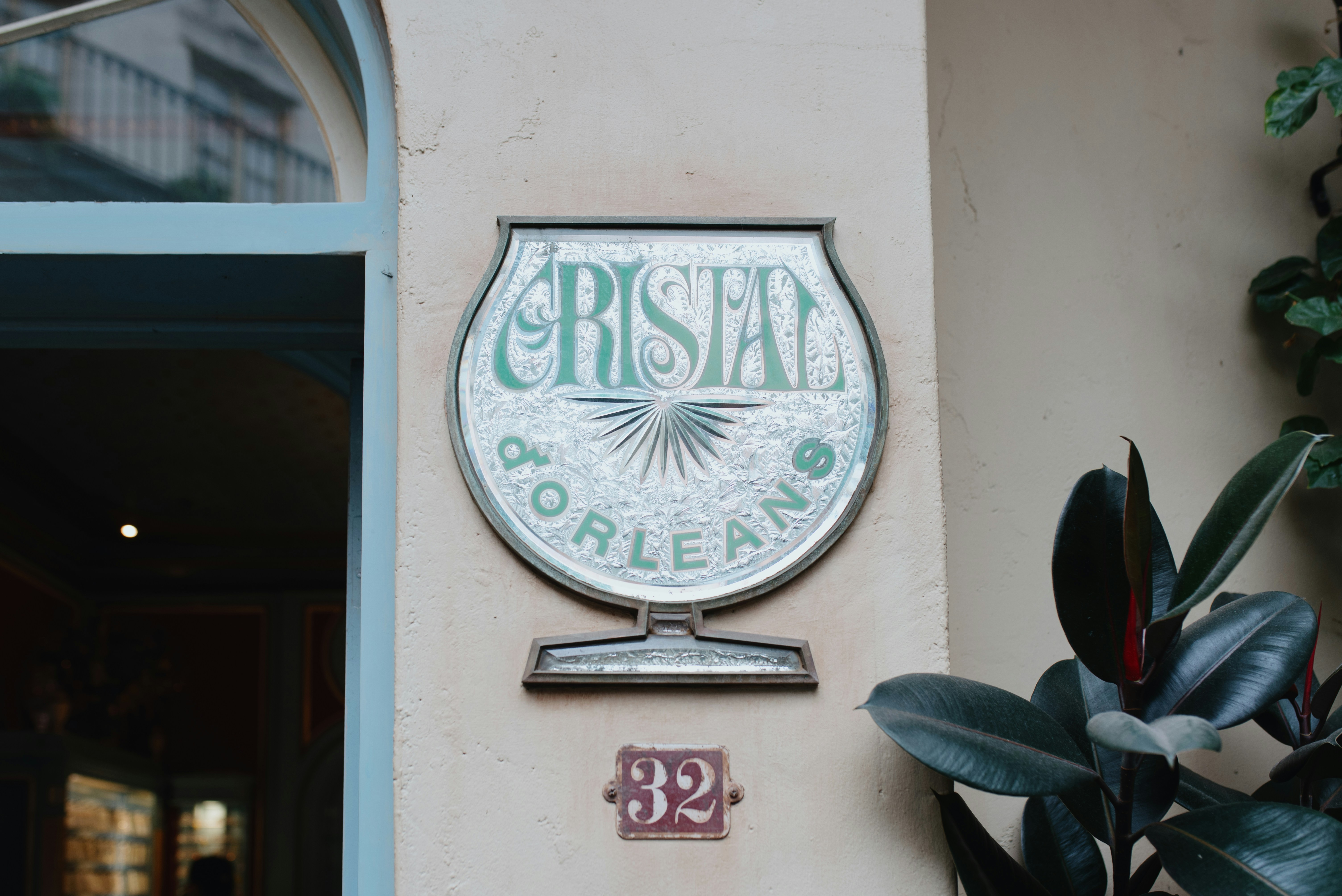 Cristal Oraleans Sign on a Sunlit Facade