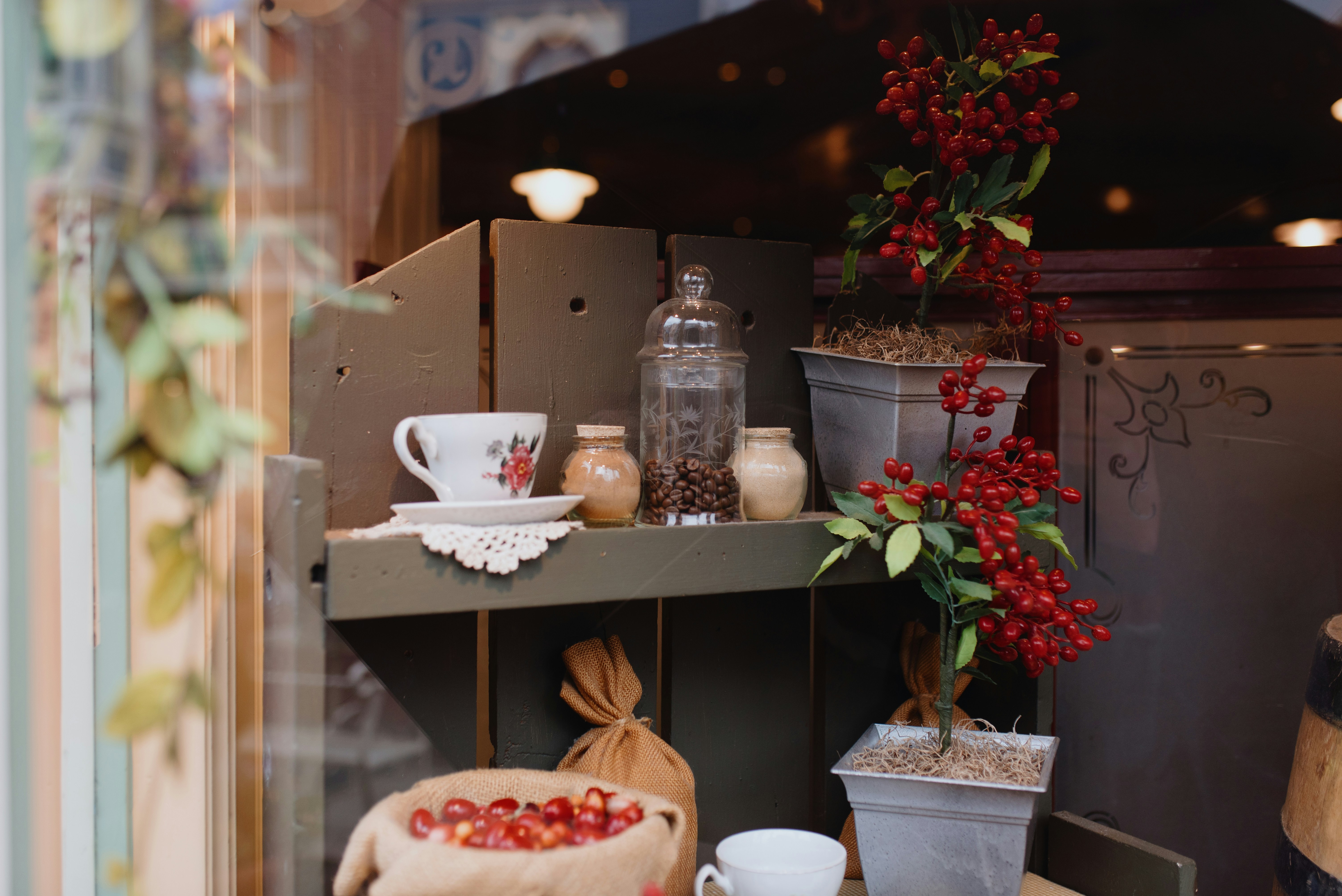 Harvest of Delights: A Cozy Window Display of Berries and Ceramics