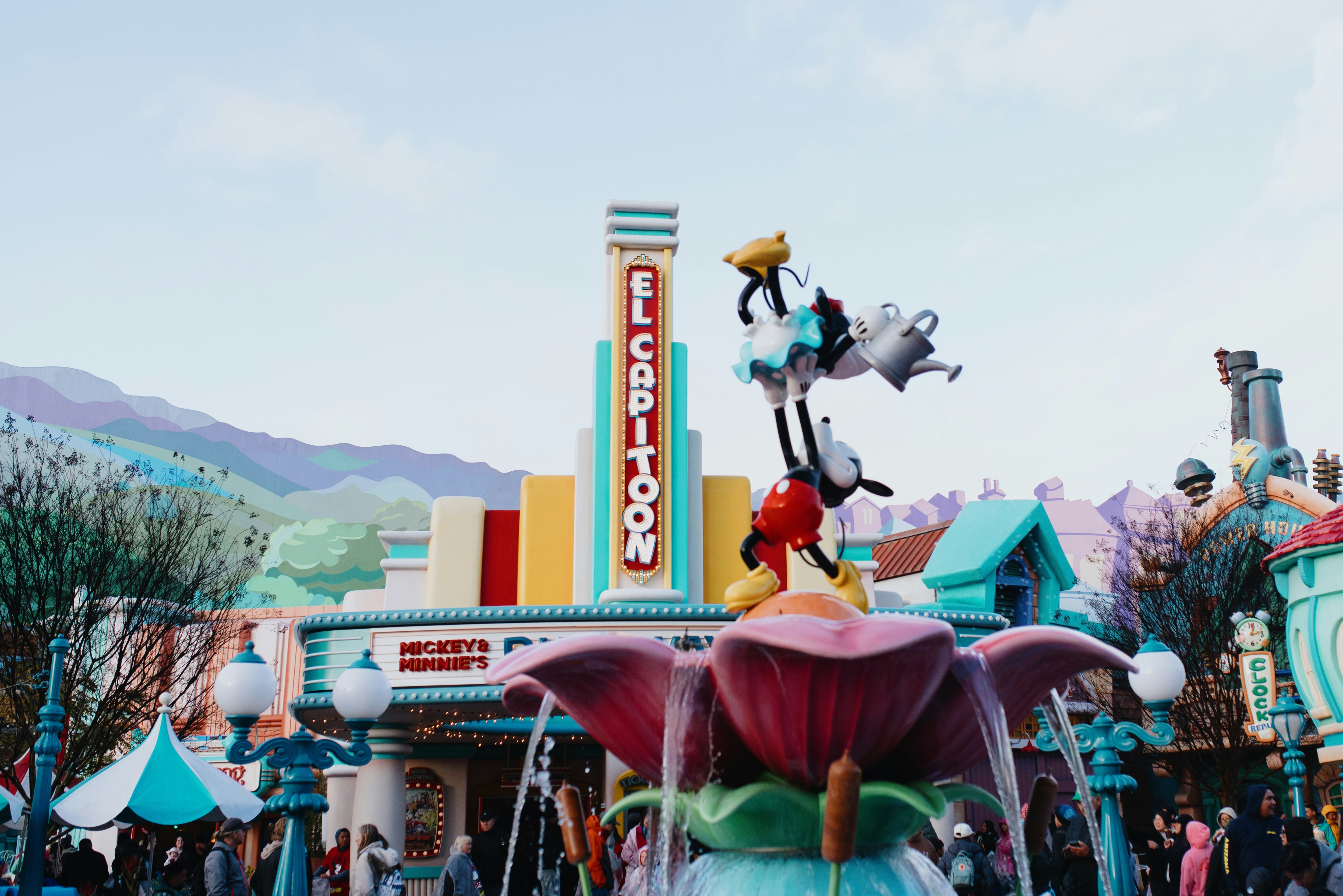 Colorful Carousel Topper at a Whimsical Park Entrance