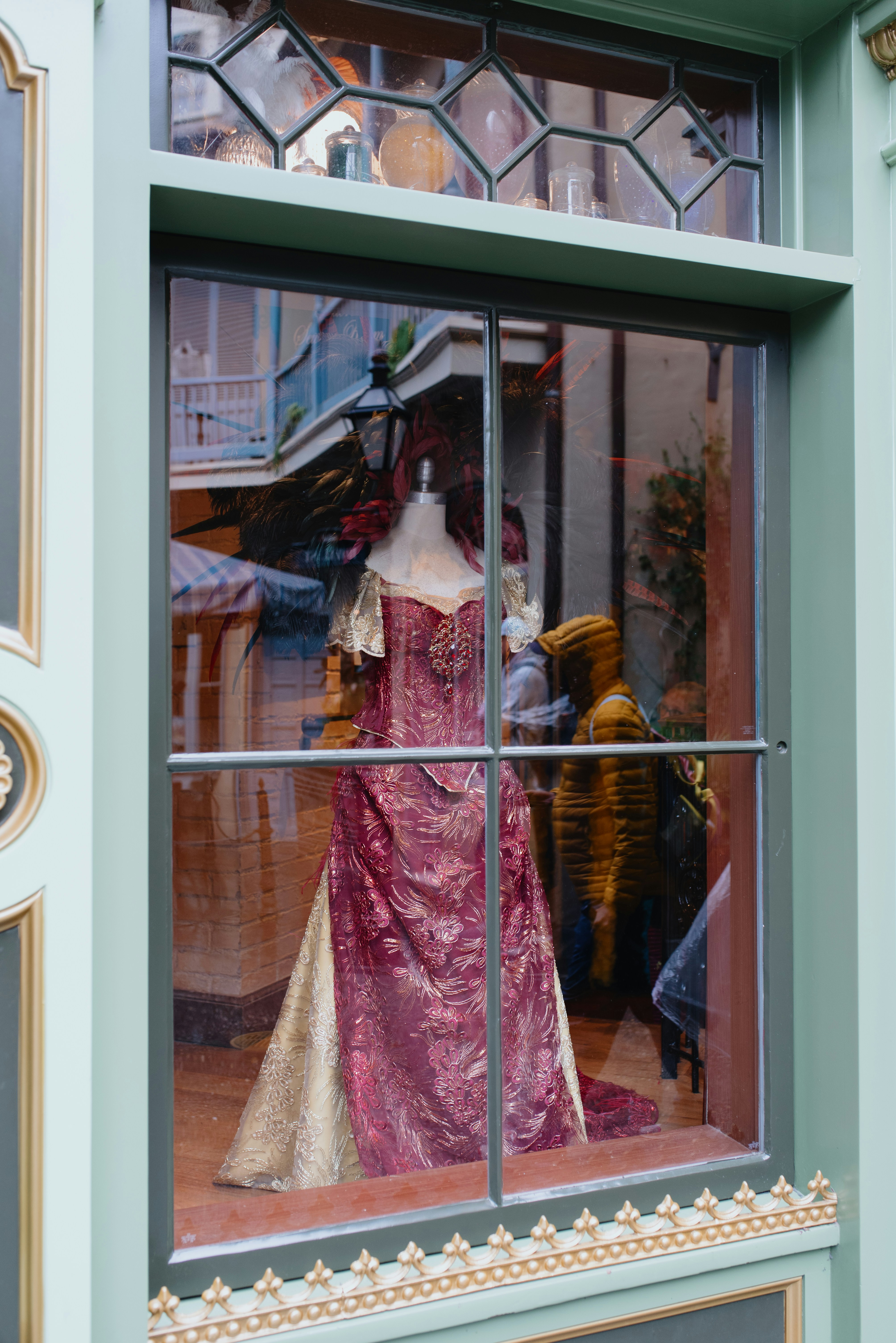 Dress in the Shop Window: Velvet Gown Surrounded by Reflections