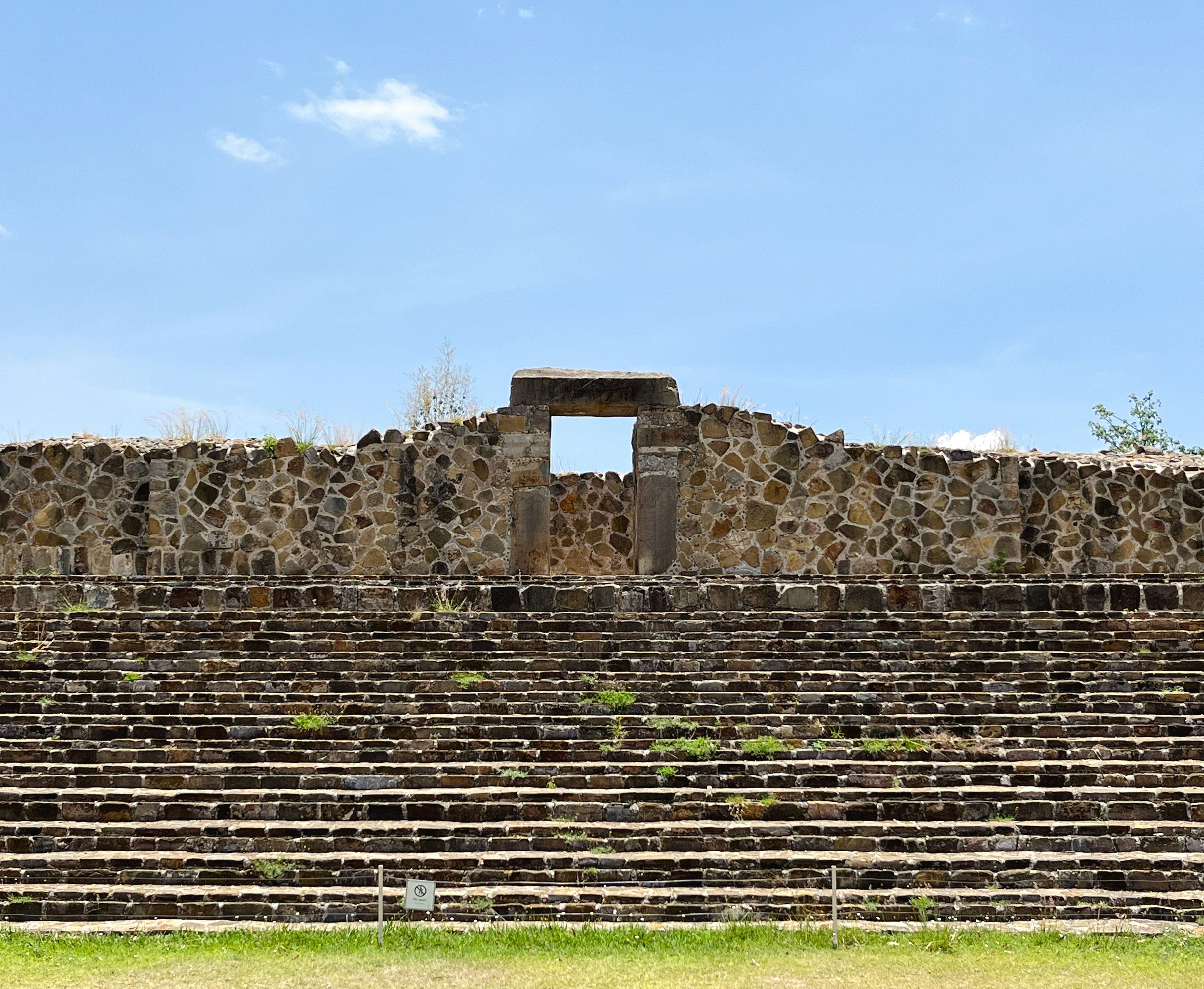 Stone Staircase Sunrise: Ancient Half-Radiant Walls Framing an Opening