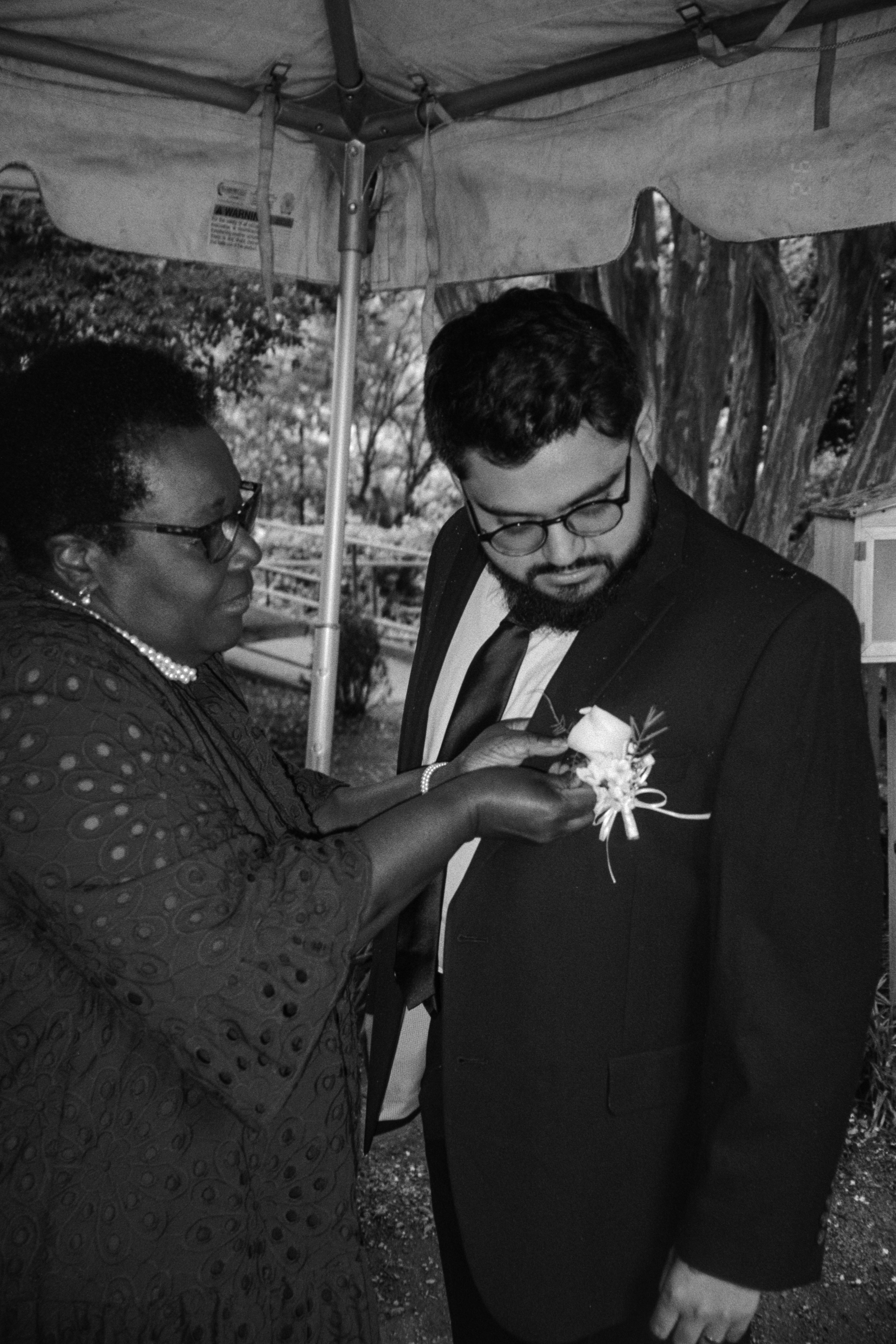 Moment of Wardrobe Ceremony: Ties, Boutonniere, and Trust