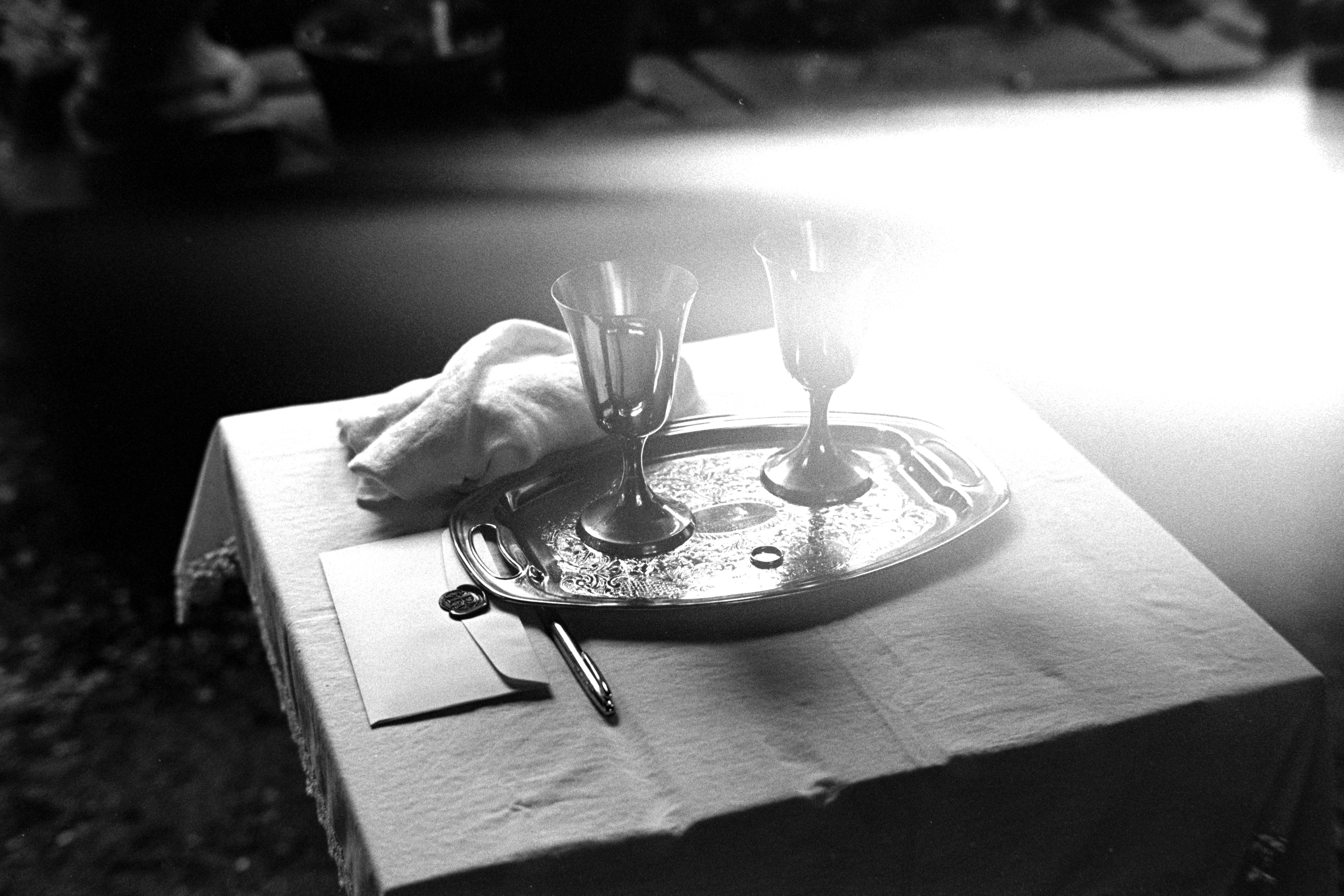 Moonlit Table: Silent Toast with Glasses on a Linen Tablecloth