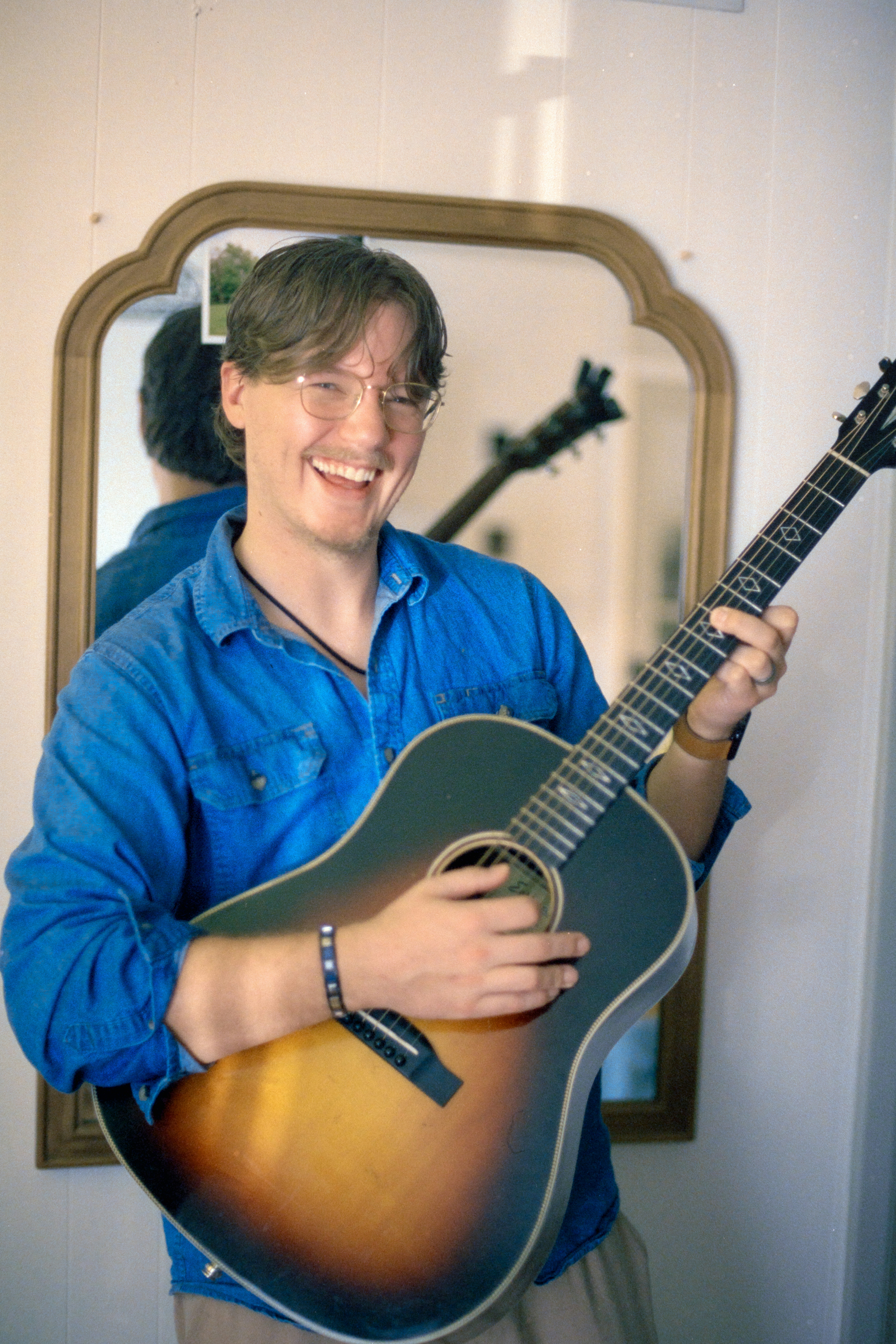 Midbright Serenade: A guitarist in a sunlit room