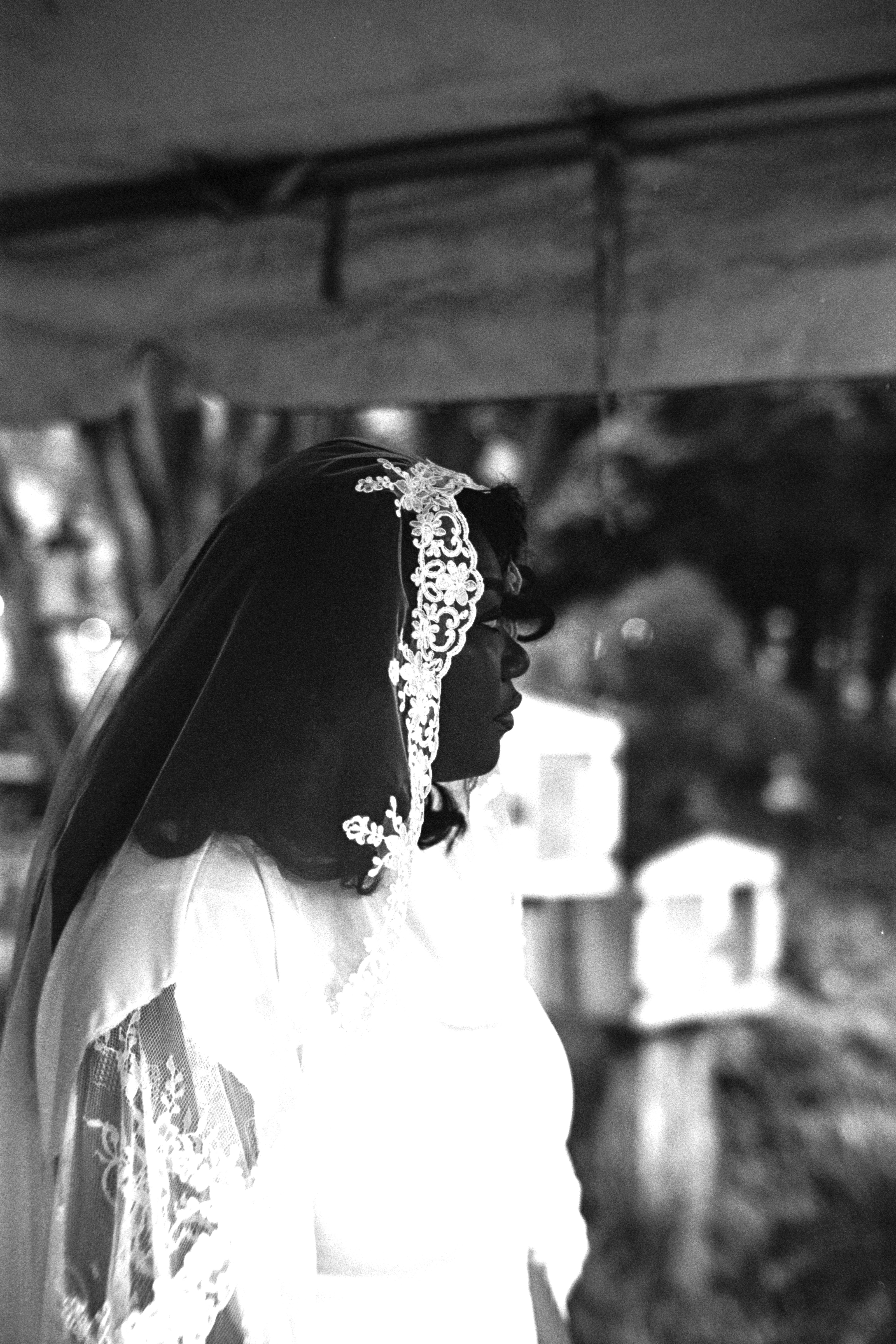 Veiled Bride in Quiet Light Under the Eaves