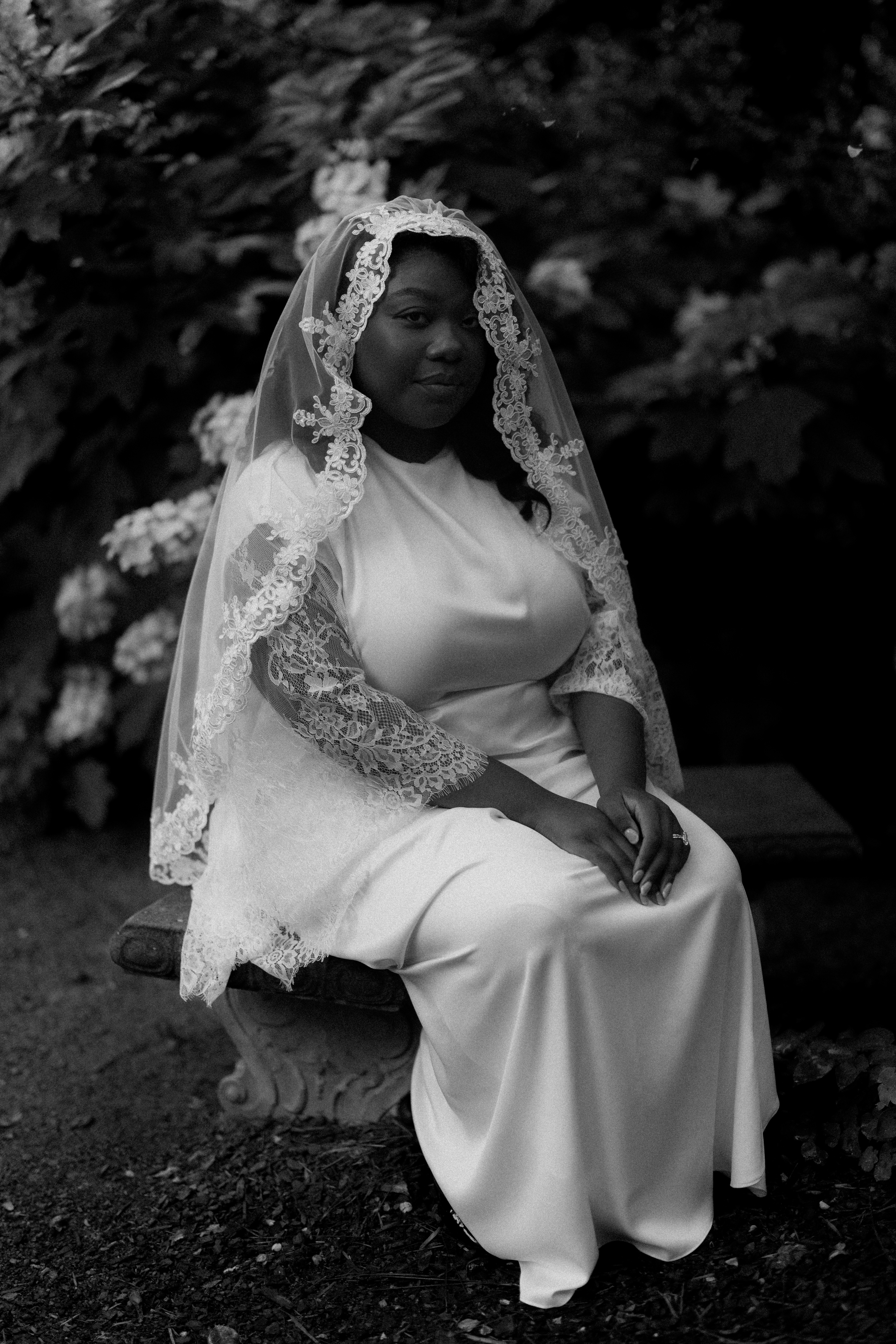 Bride in Lace: Quiet Grace on a Garden Bench