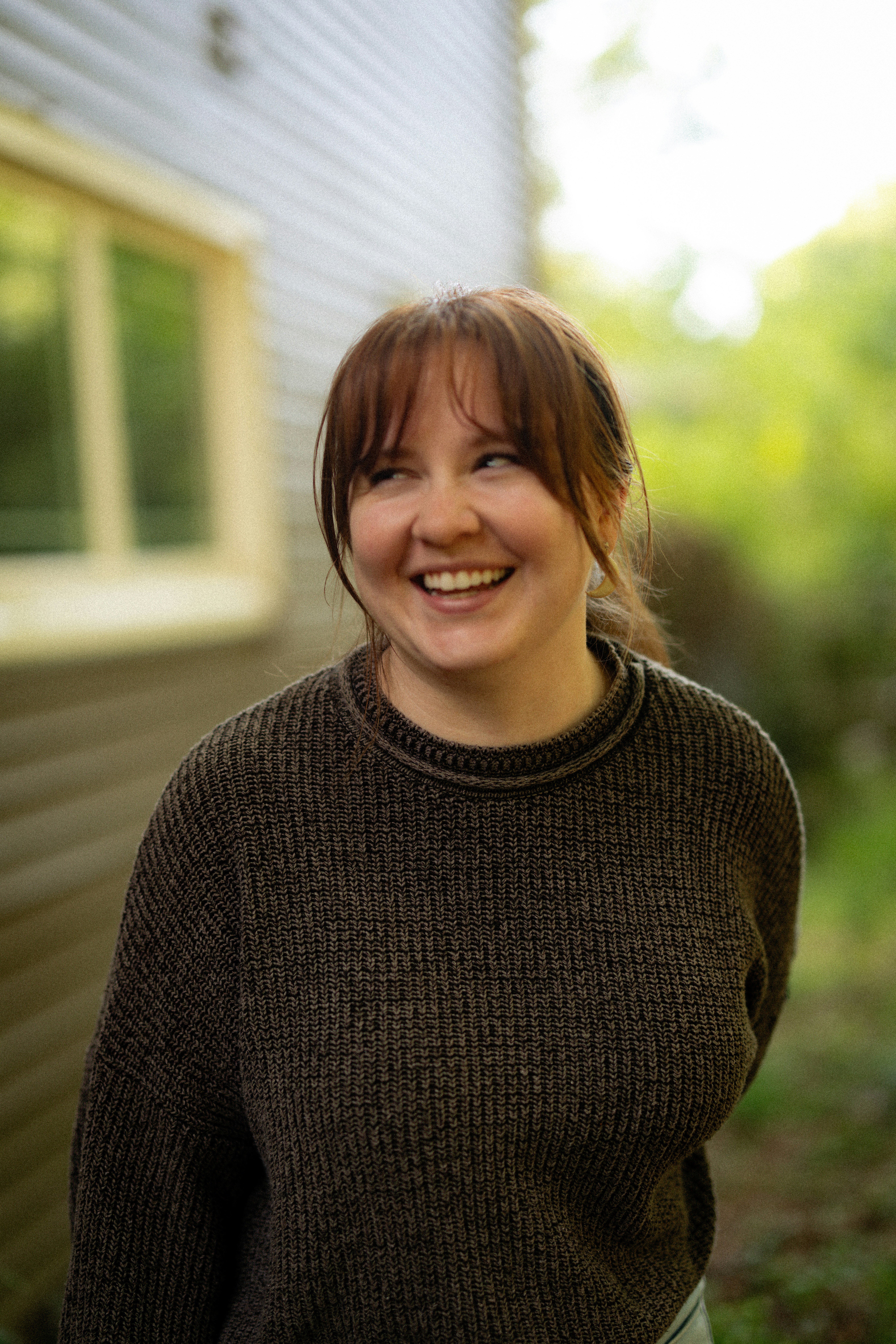 Soft Morning Laugh: Portrait by the Shed