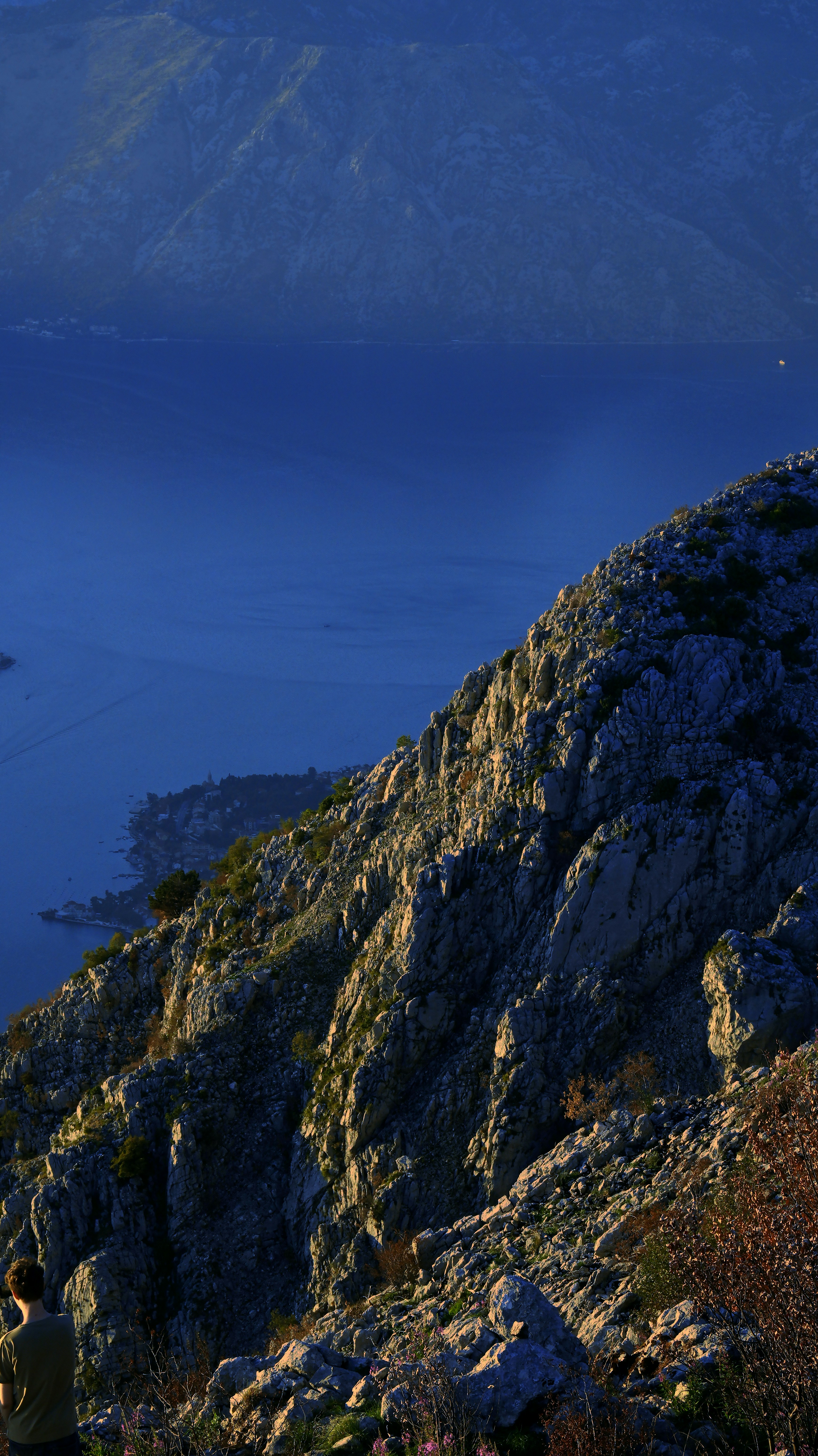 Sunlit Crag Overlooking Aegean Blue