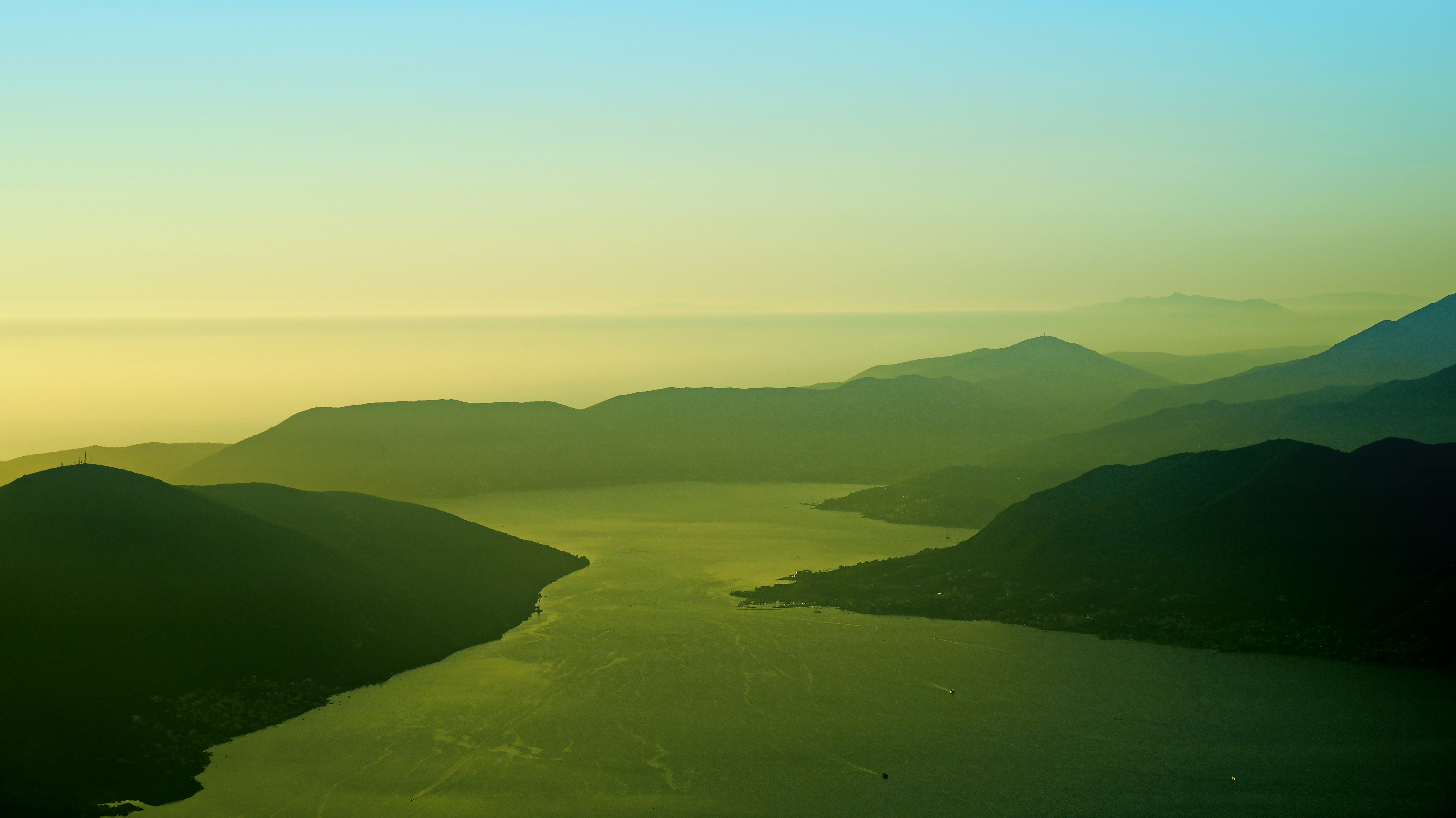 Serene Peninsula: Layers of Coastline Beneath a Quiet Horizon