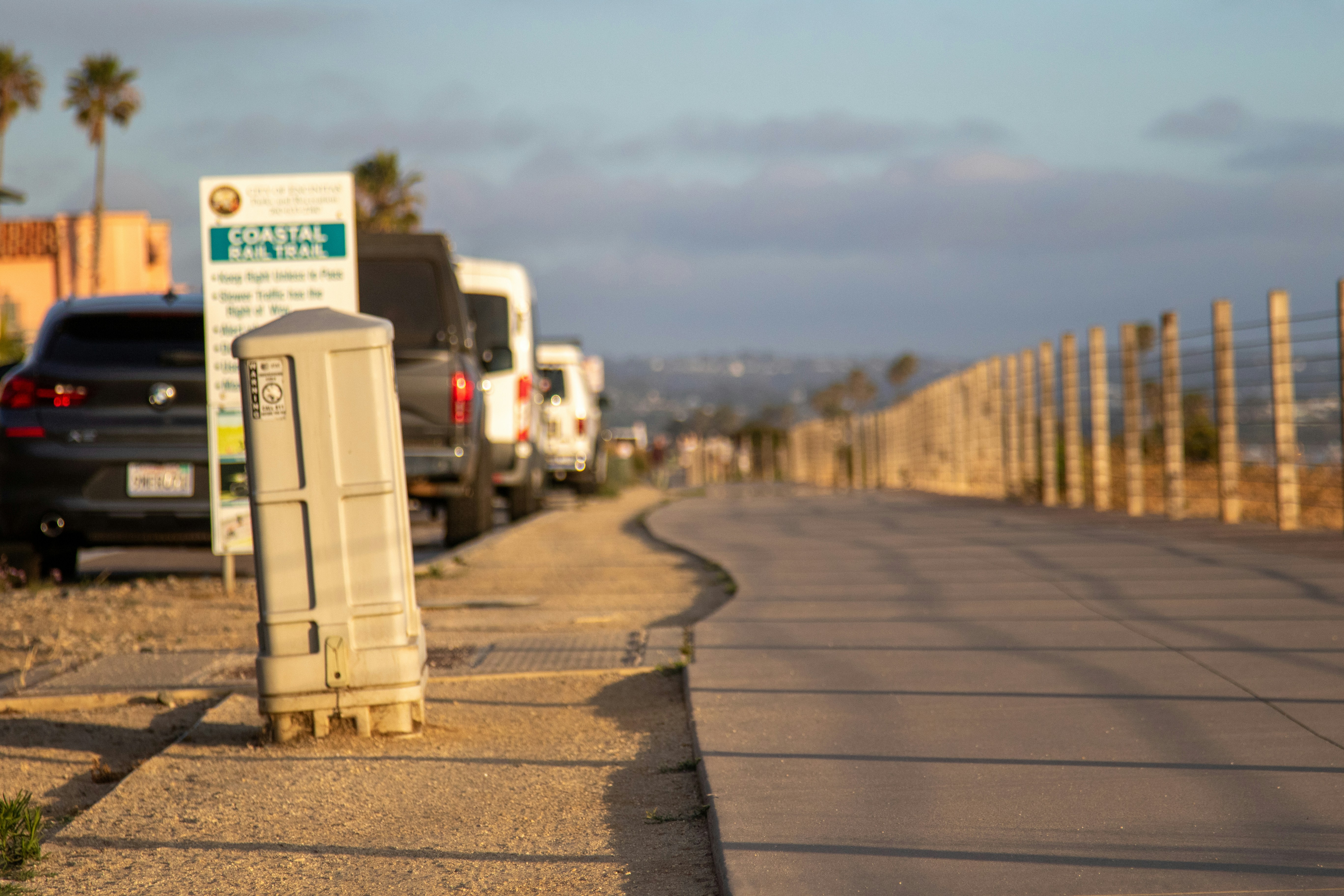 Street-side Utility Pole and Pathway Leading to Distant Horizon