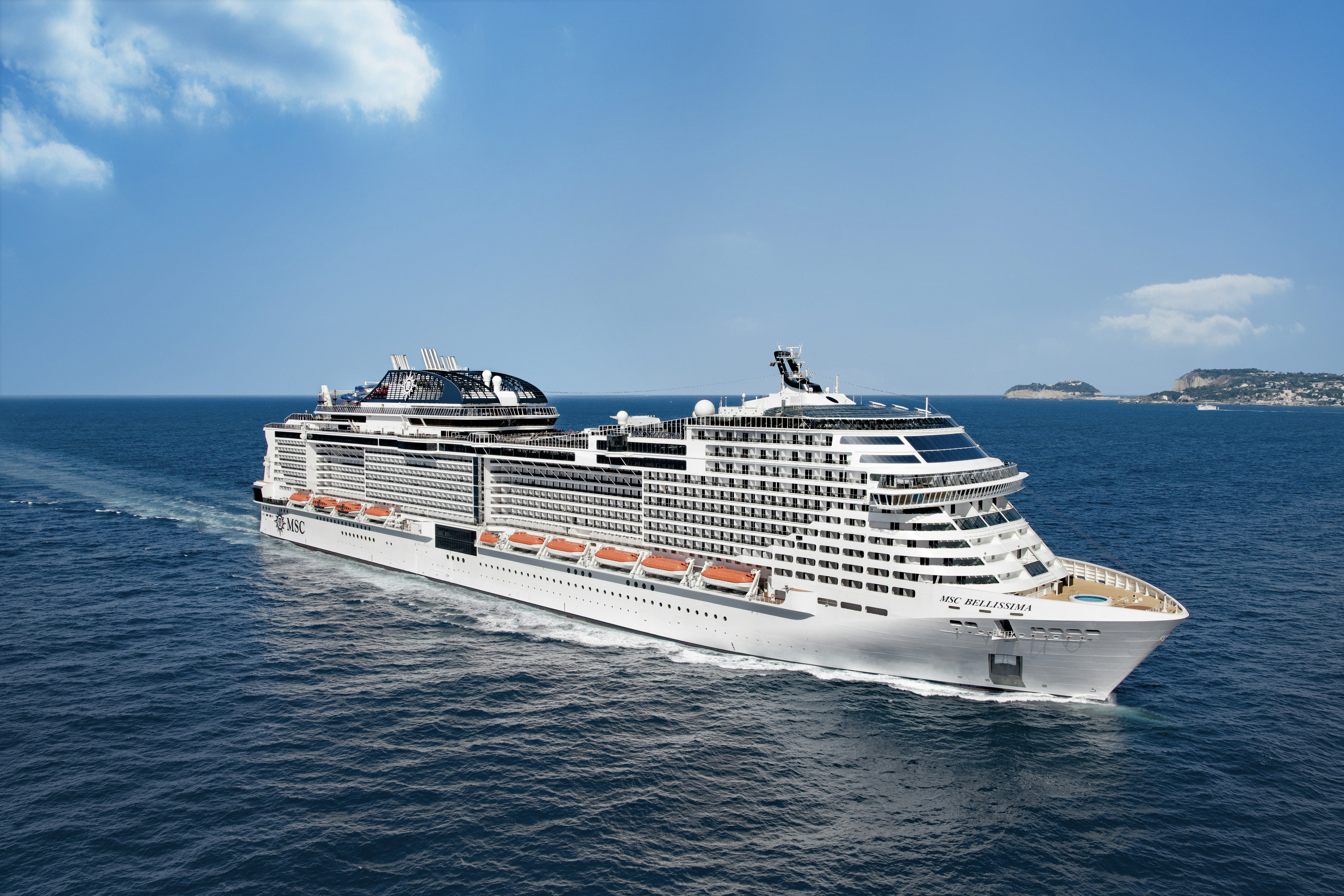 White Majesty: A Cruise Ship Cutting Through Azure Seas