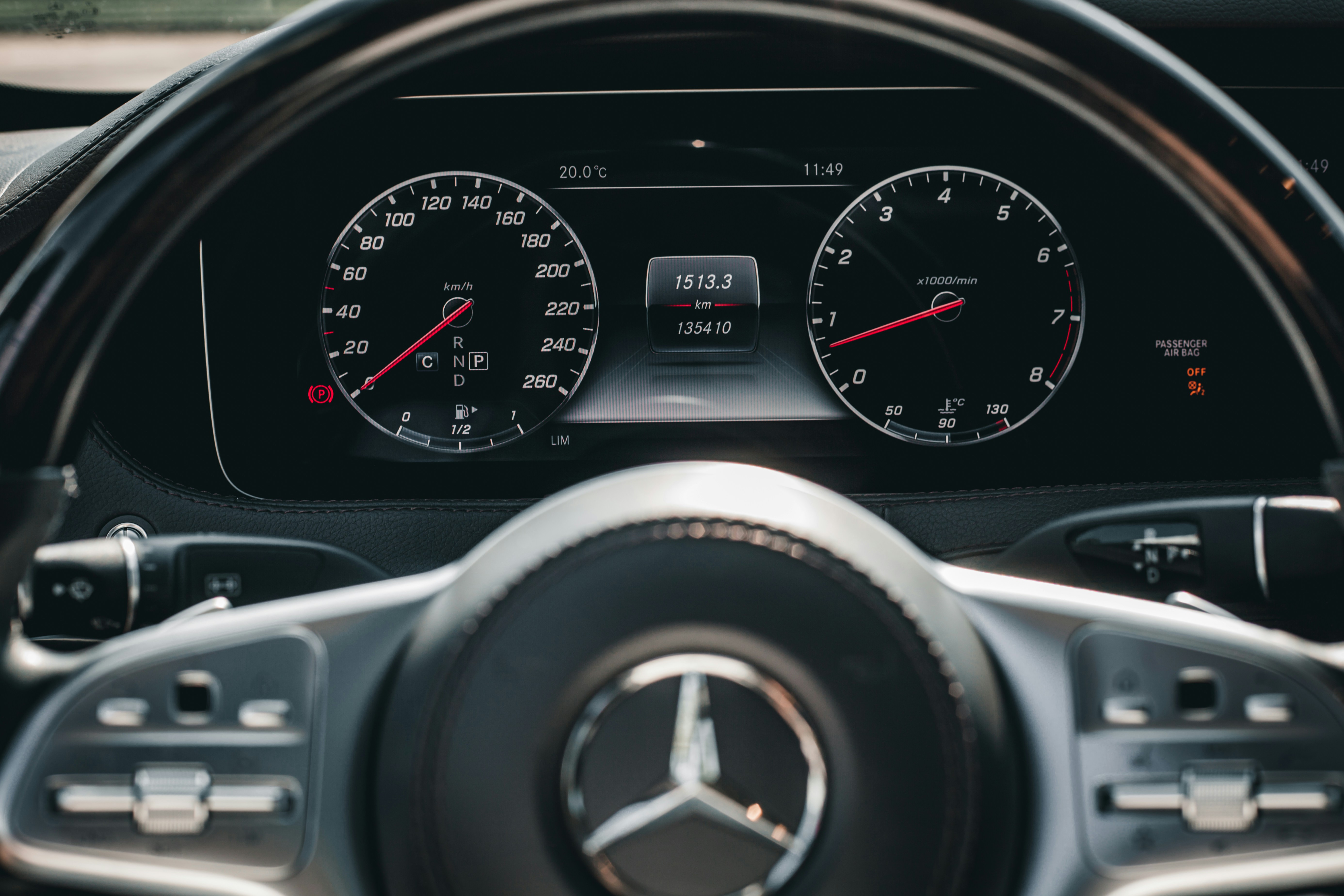 Steering Wheel Perspective: Mercedes Instrument Cluster in Focus