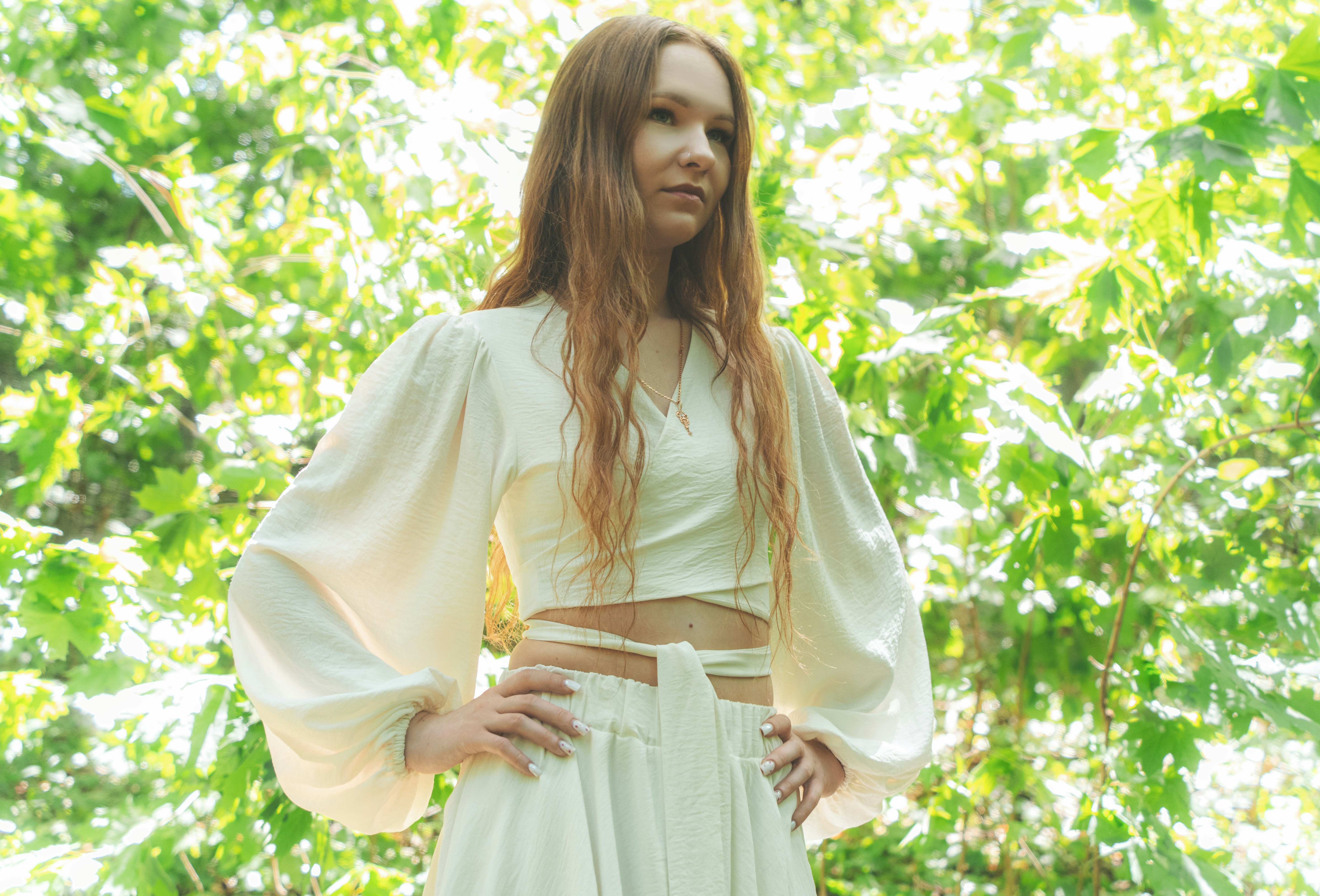 Sunlit Ember: A Portrait in Verdant Light