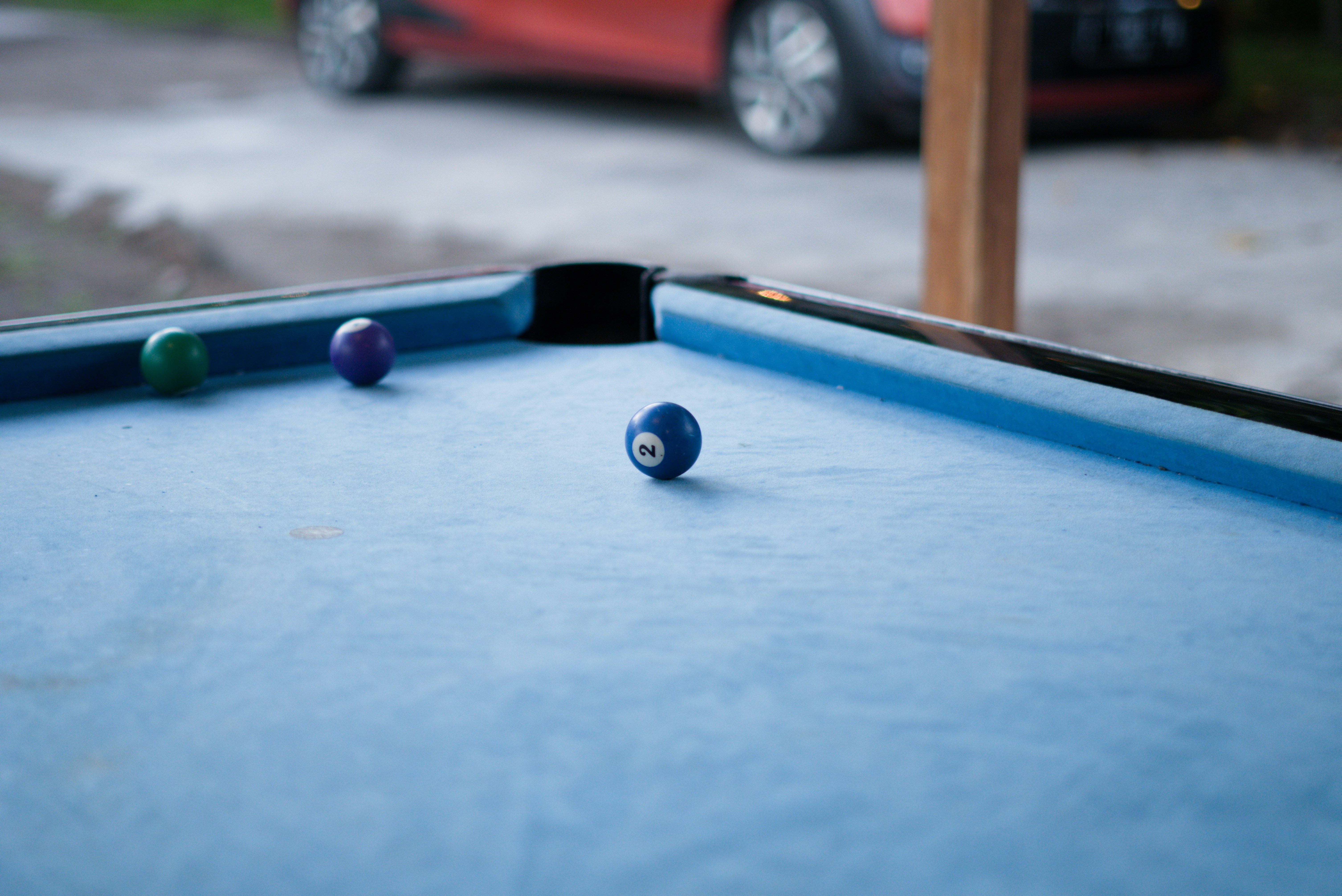 Blue Pool Ball in Focus: A Quiet Moment on the Billiard Table