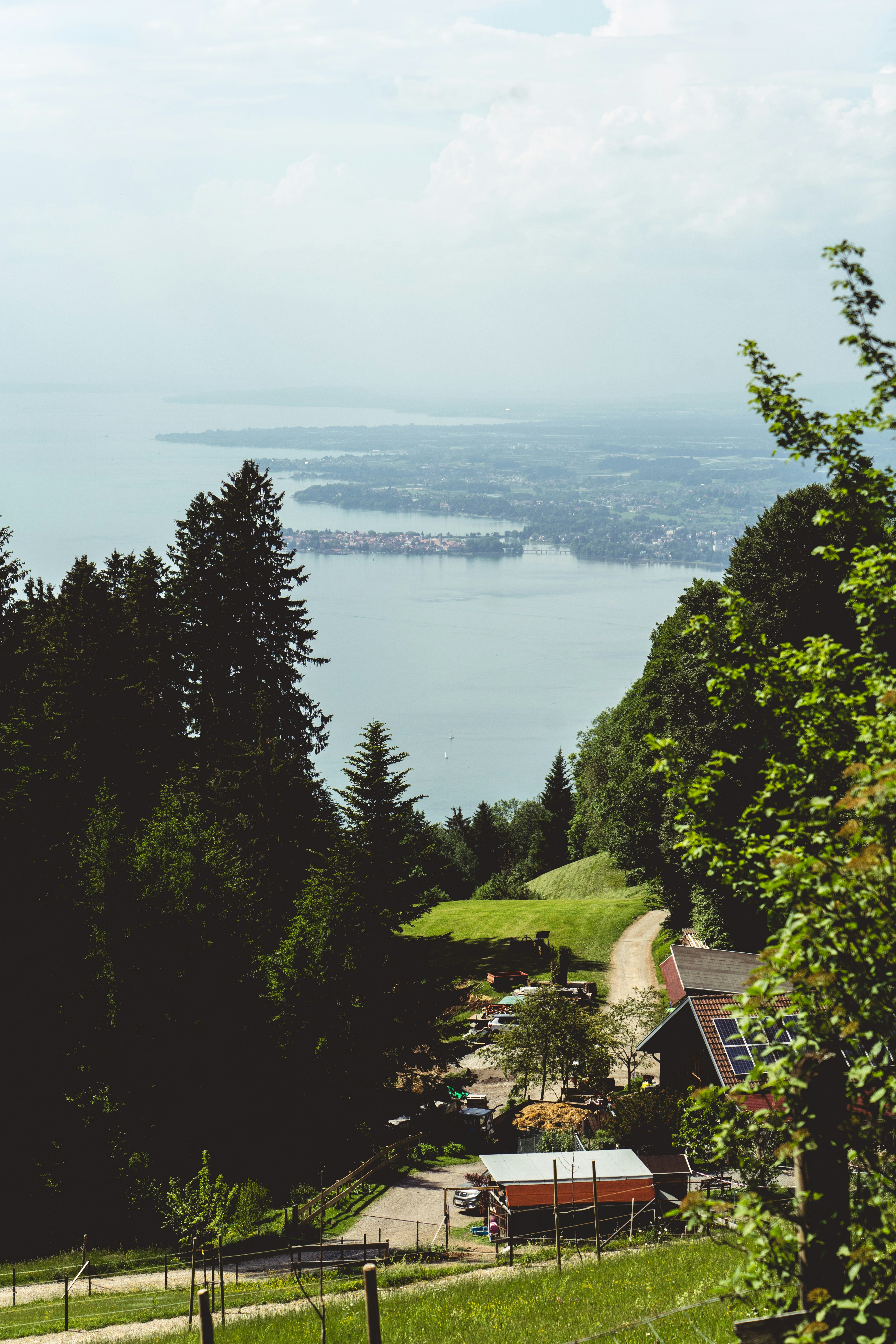 Green Hills Over the Lake: A Serene Mountain Vista