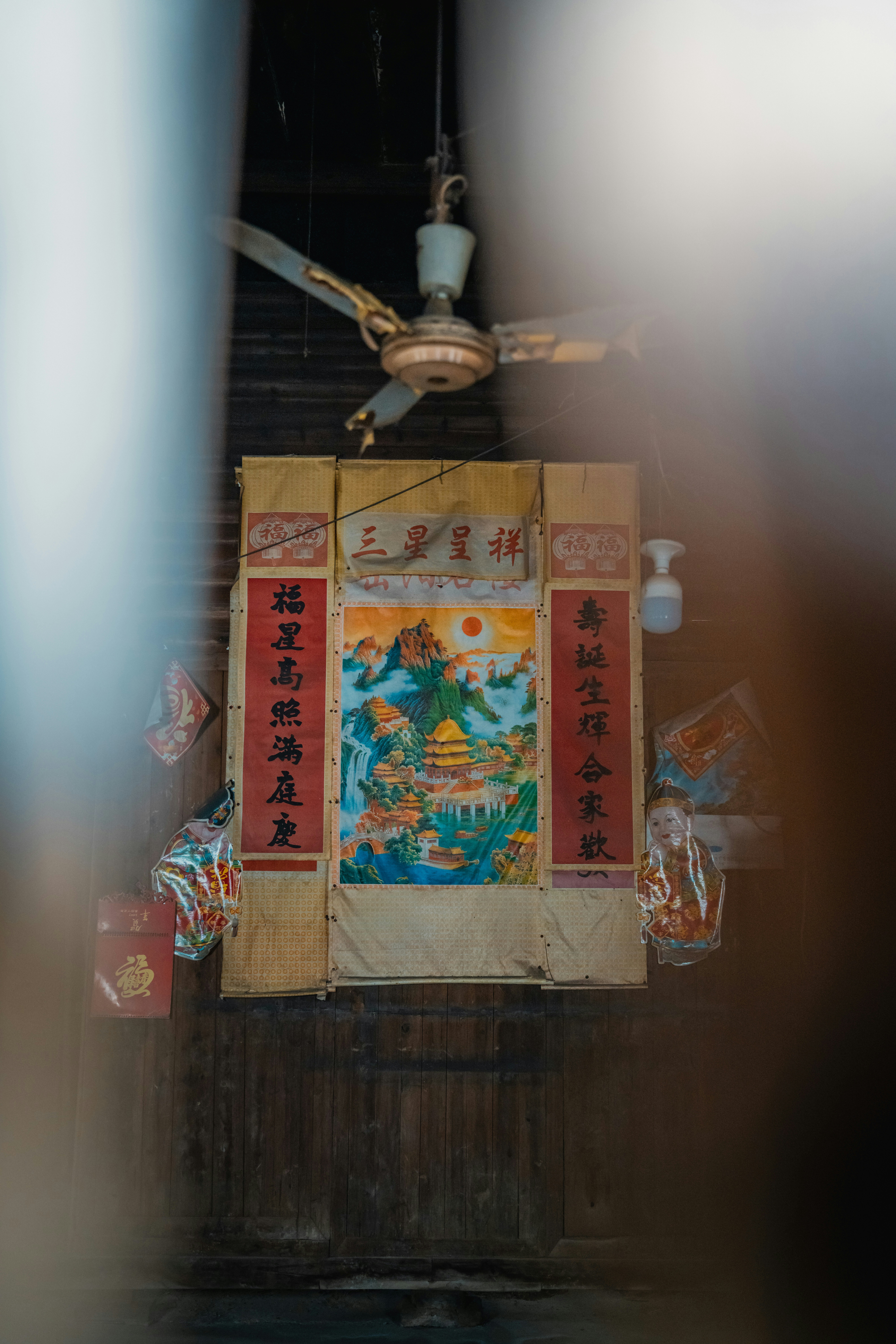 Shrine of Colorful Panels: A Quiet Altar Through a Framing Gap