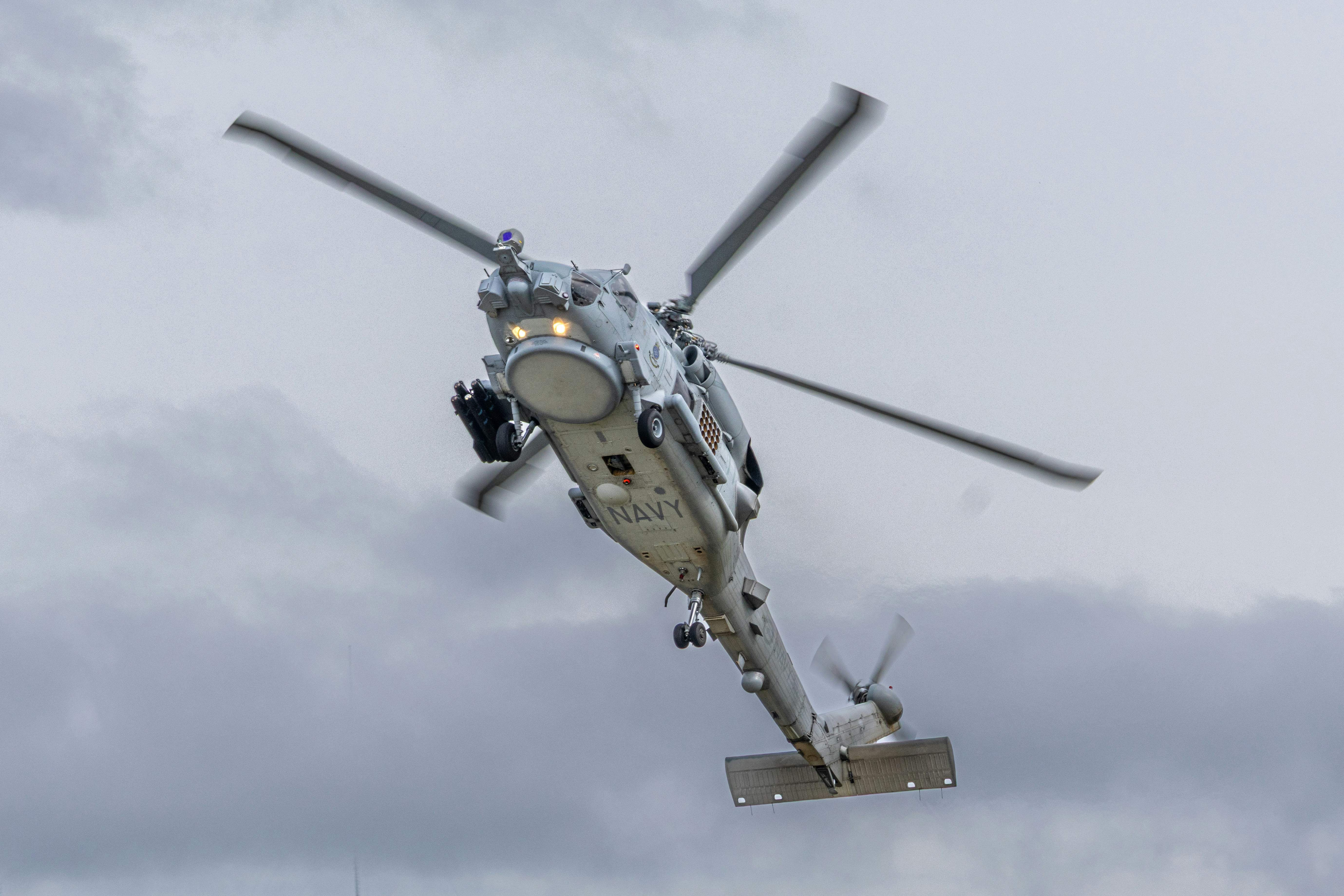Helicopter in Transition: Mid-Flight Glide Against a Dusky Sky