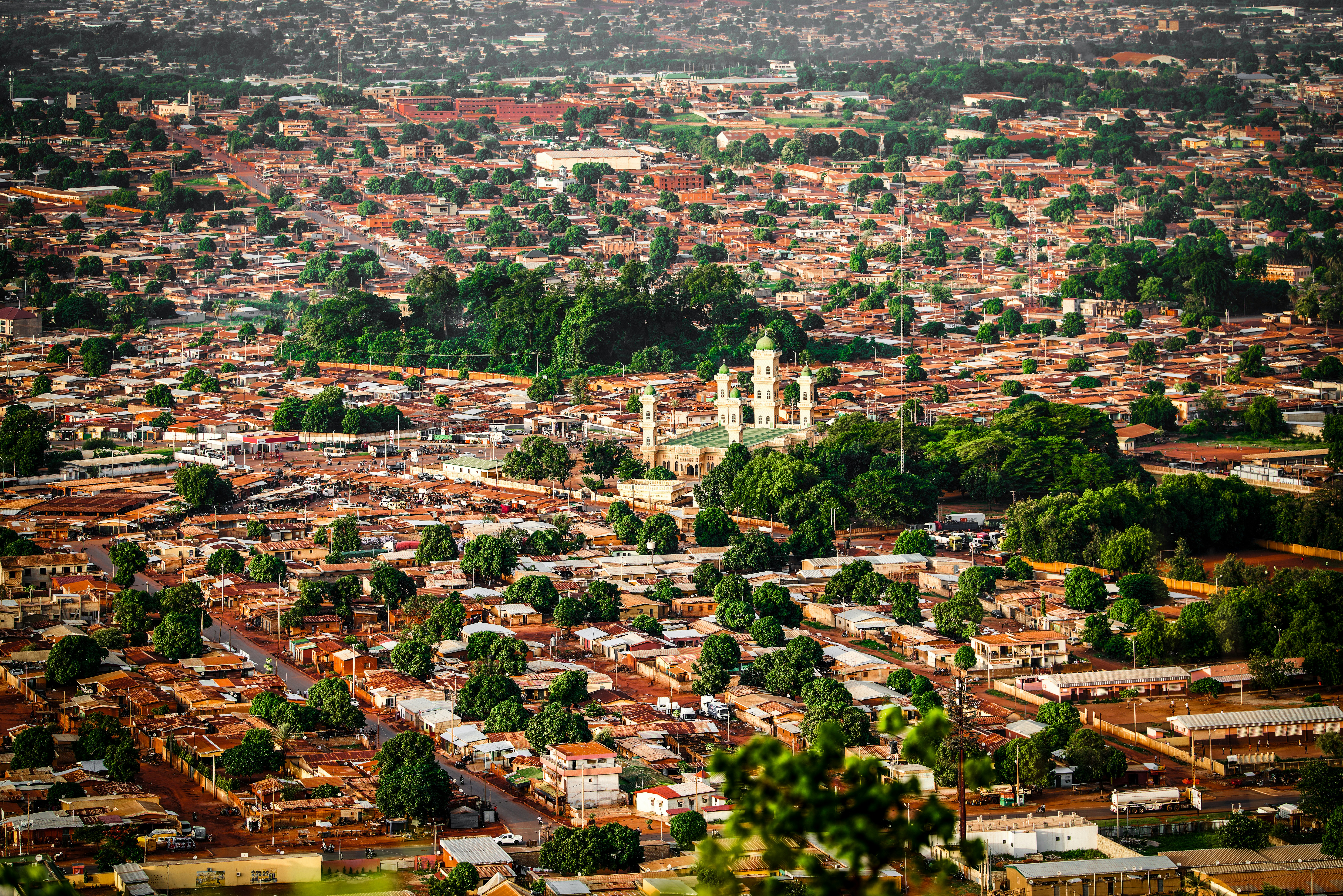 Aerial Portrait Above a Red-Tiled Neighborhood