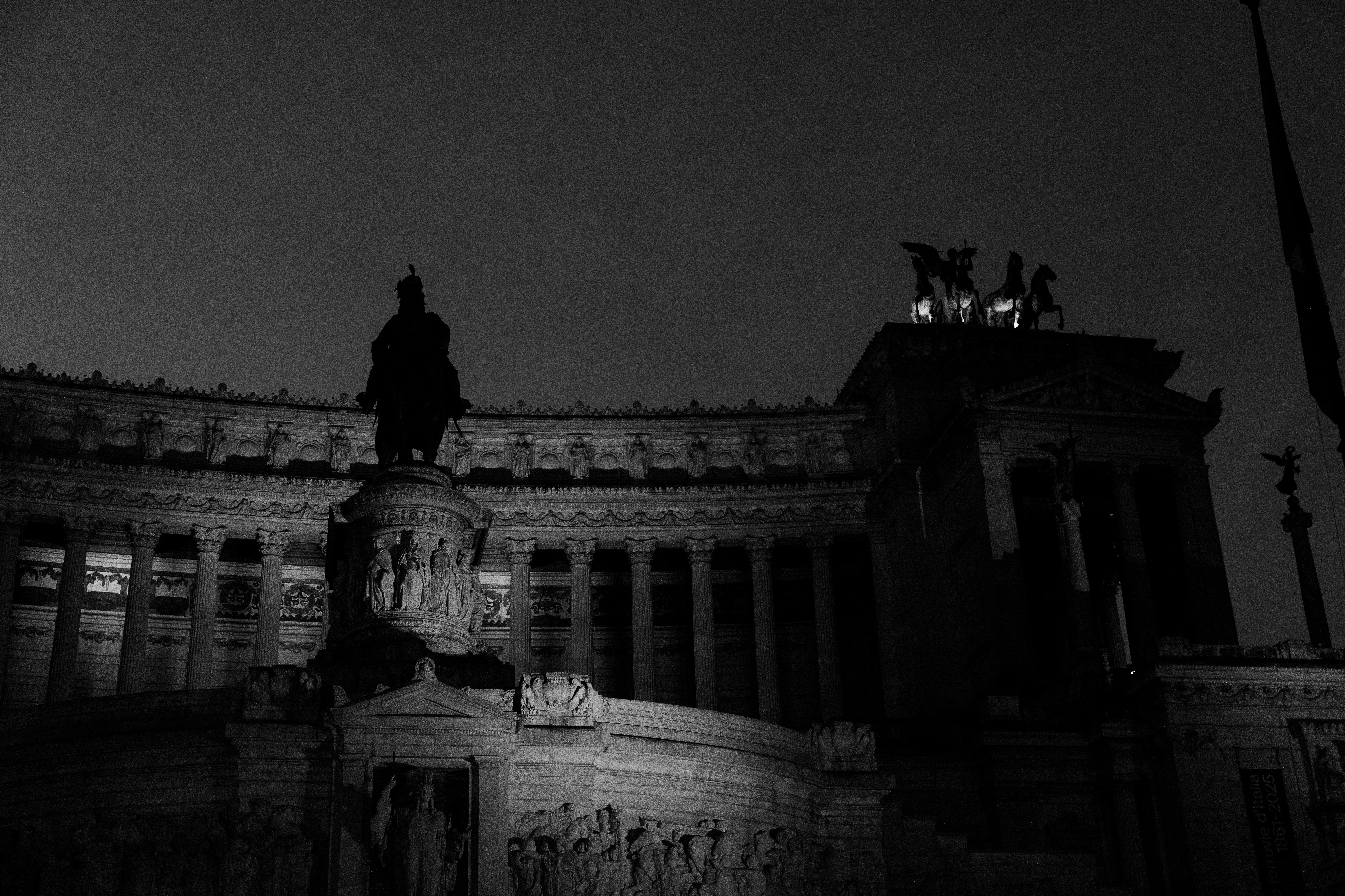 Monumental Silhouette: A Darkened Arc of History
