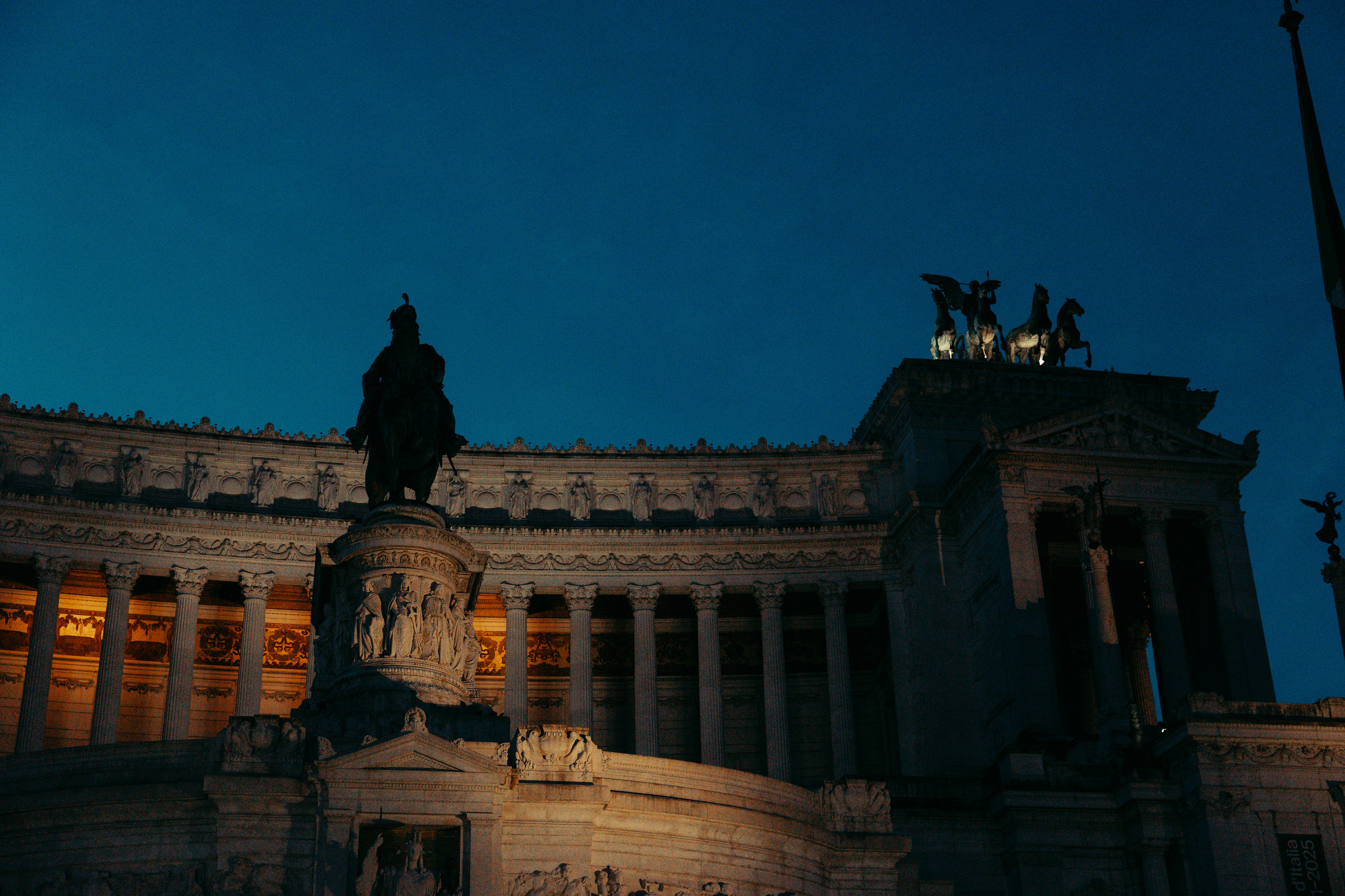 Silhouetted Monuments Under Evening Sky