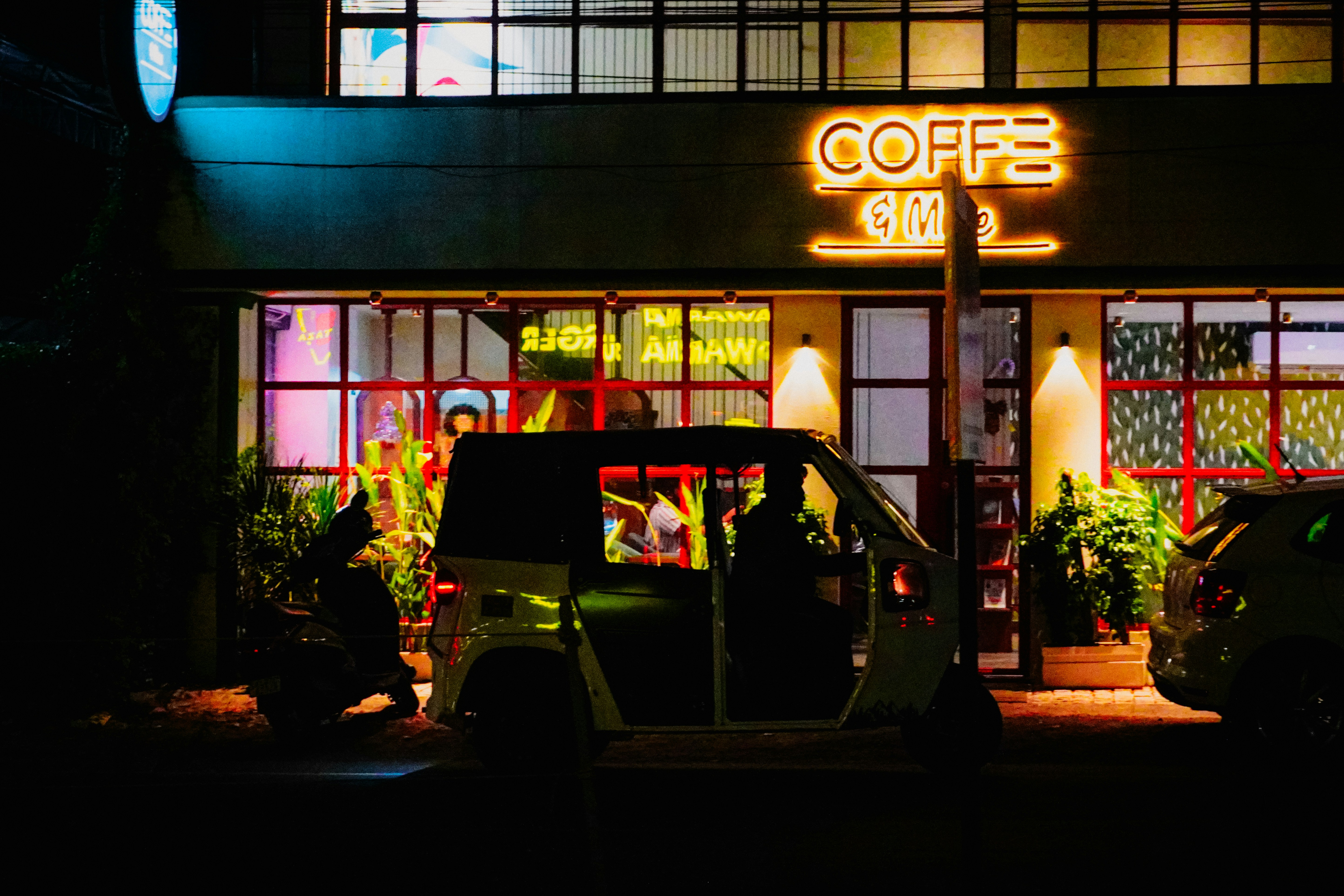 Neon Coffee Night: A Quiet Street Spotlight on a Dusk-lit Café