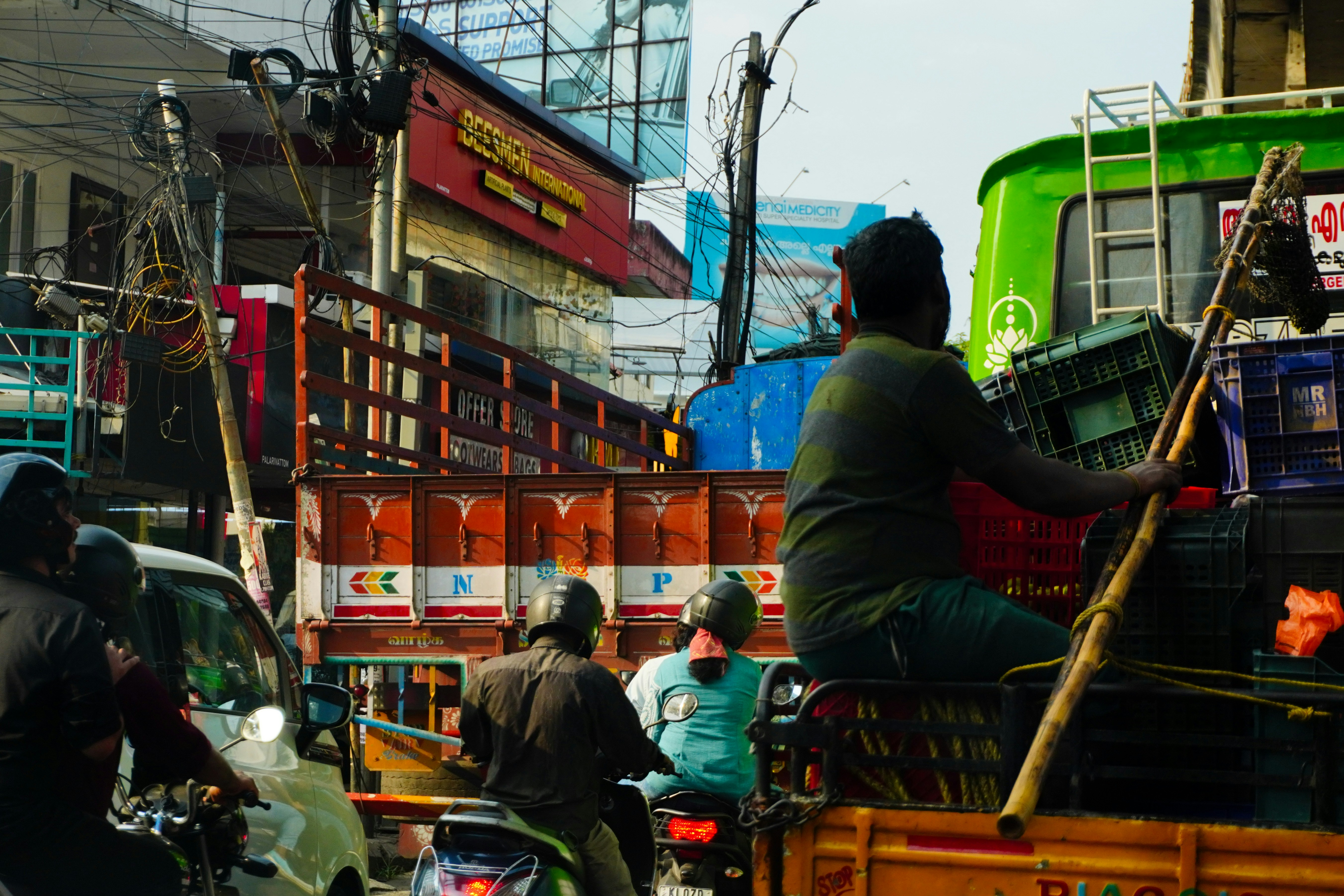 Rider Grips the Cargo Arc: A Busy Street Portrait