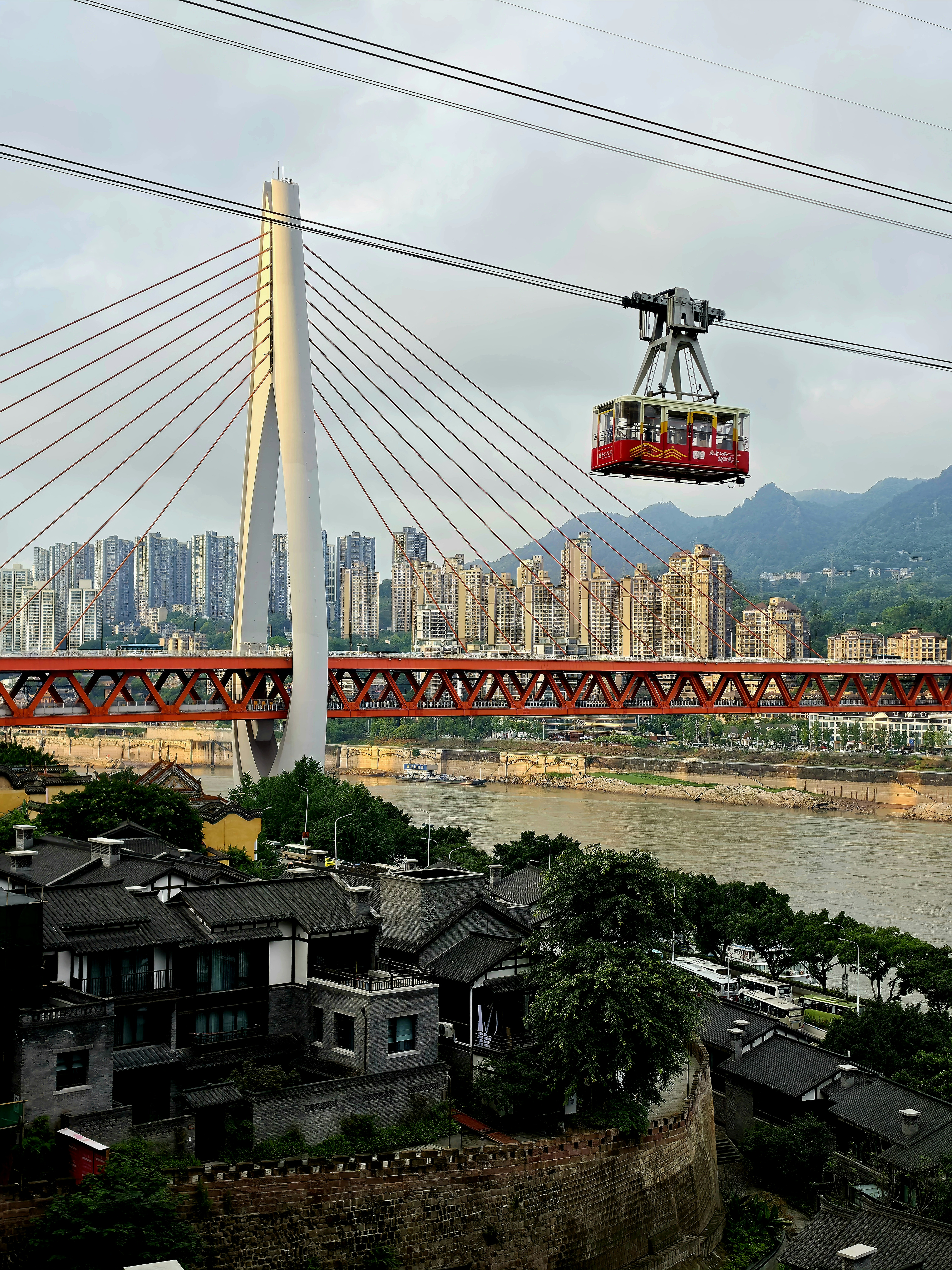 Rising Heights: A Cable-Driven City Looms Over a Historic Lane