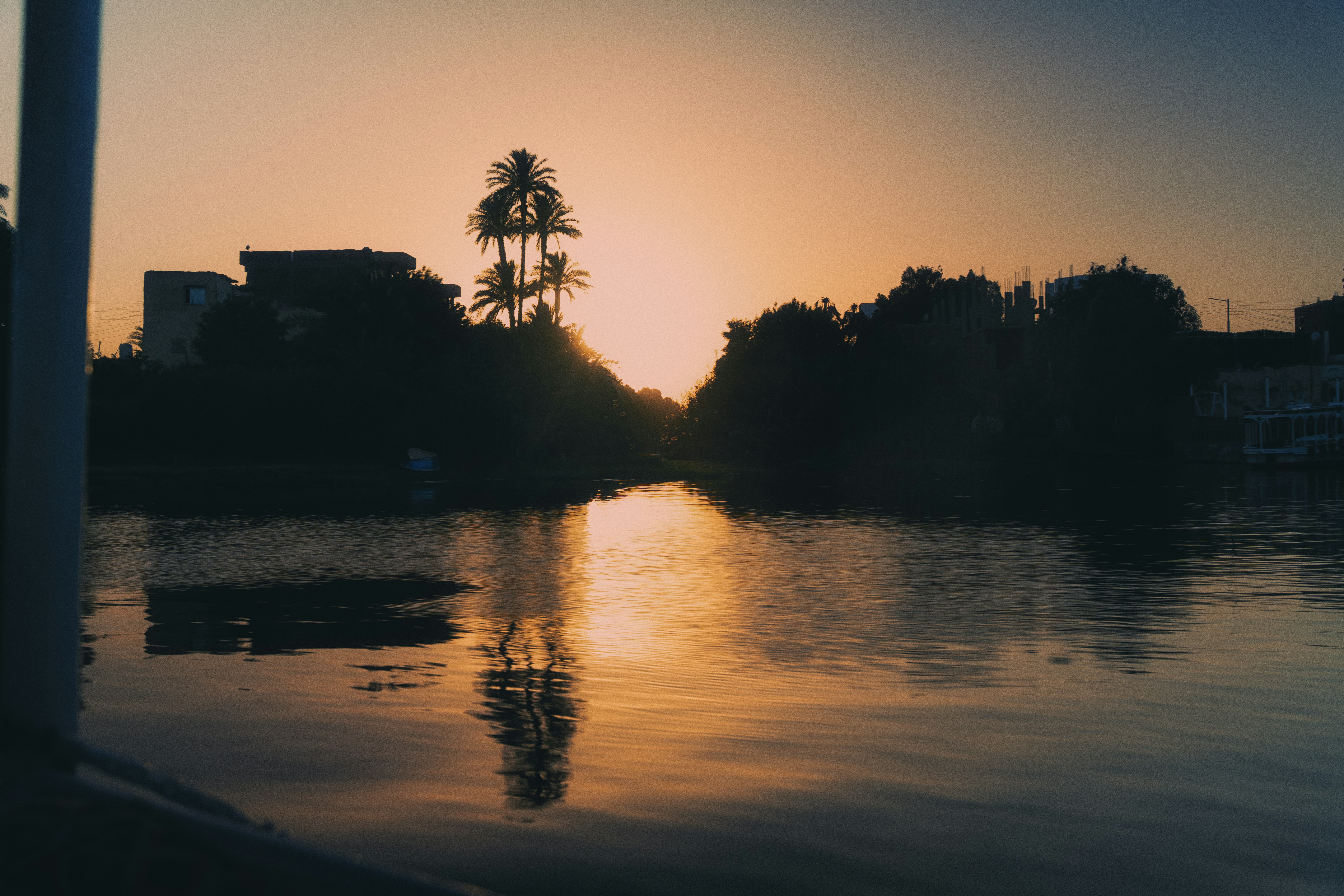 Silhouette at Sundown Over Quiet Water
