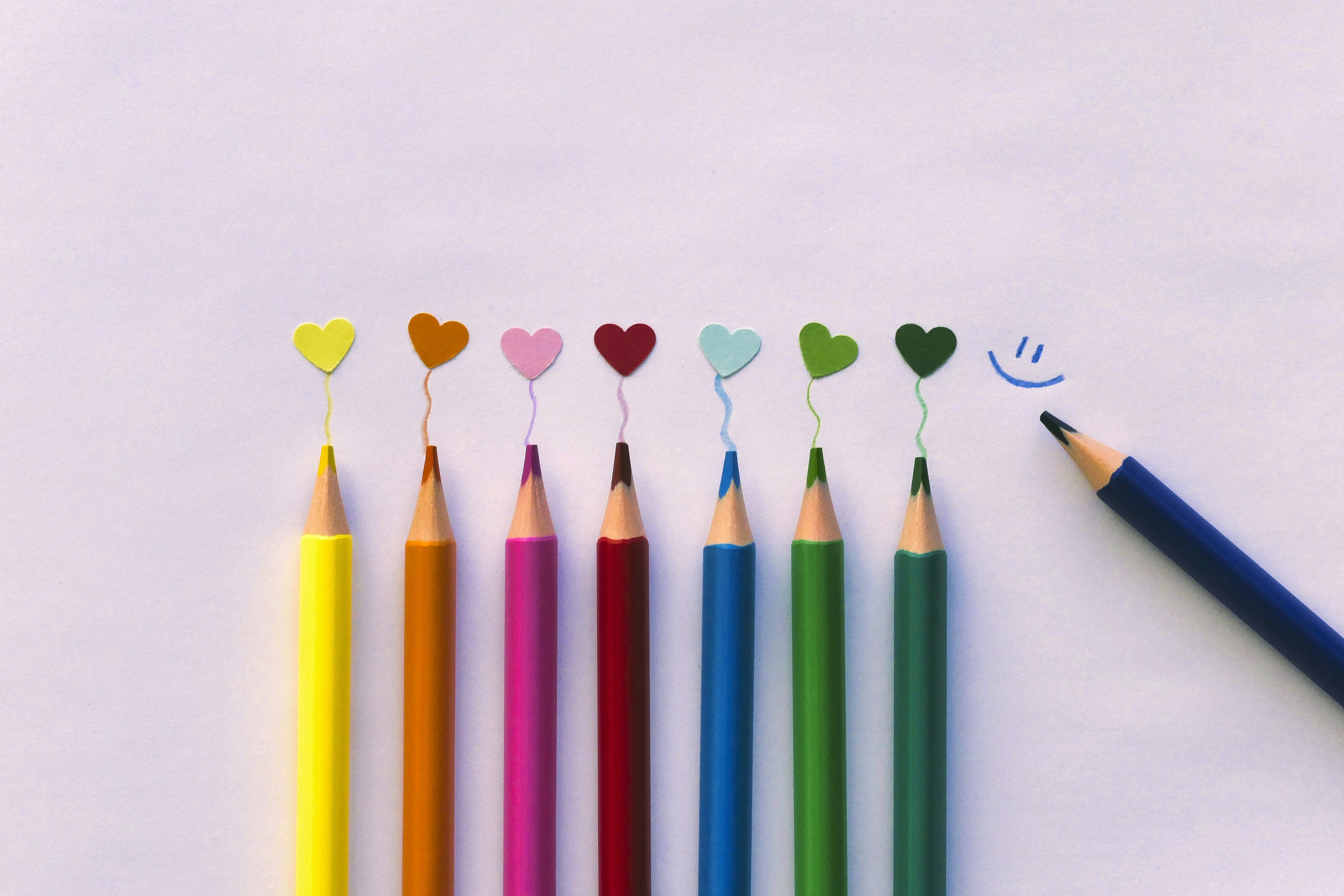 A Rainbow Ribbon of Hearts: Colored Tips Align Along a Pencil Line