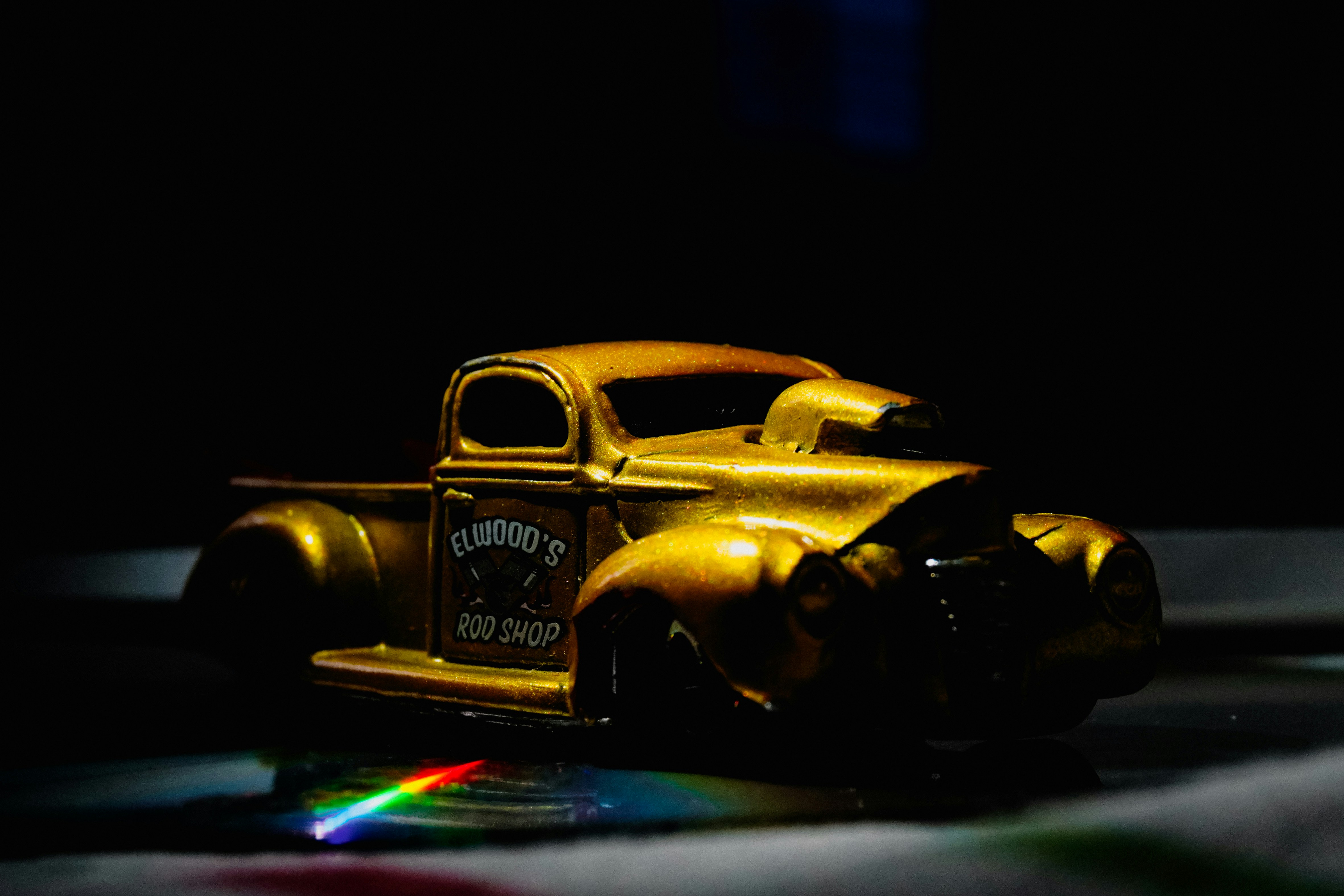 Golden Vintage Pickup Adrift on a Rainbow Disc